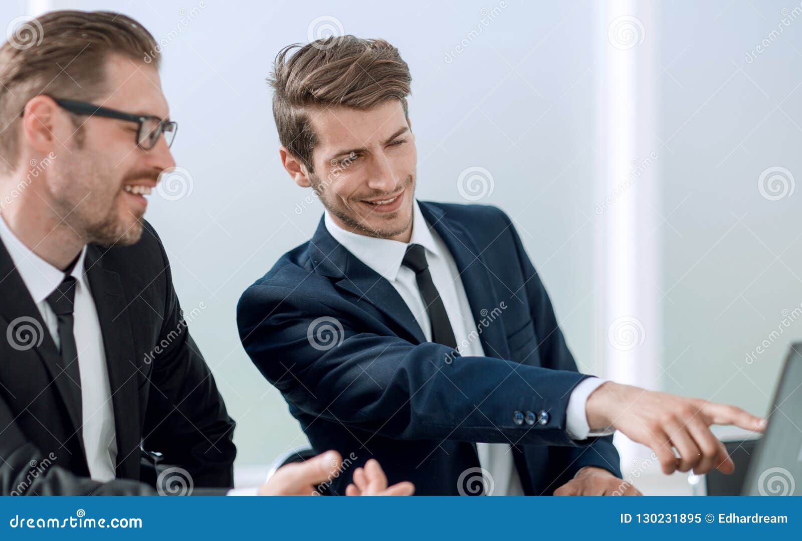 Close Up..two Businessmen Using a Laptop for Data Analysis Stock Image ...