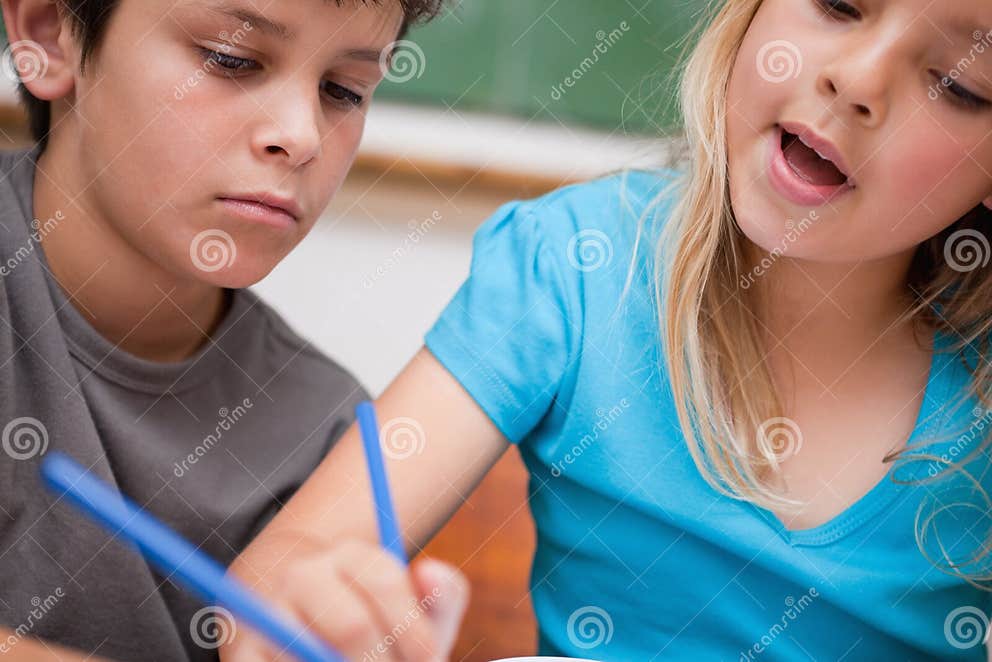 Close Up of Two Children Writing Stock Image - Image of caucasian, cute ...