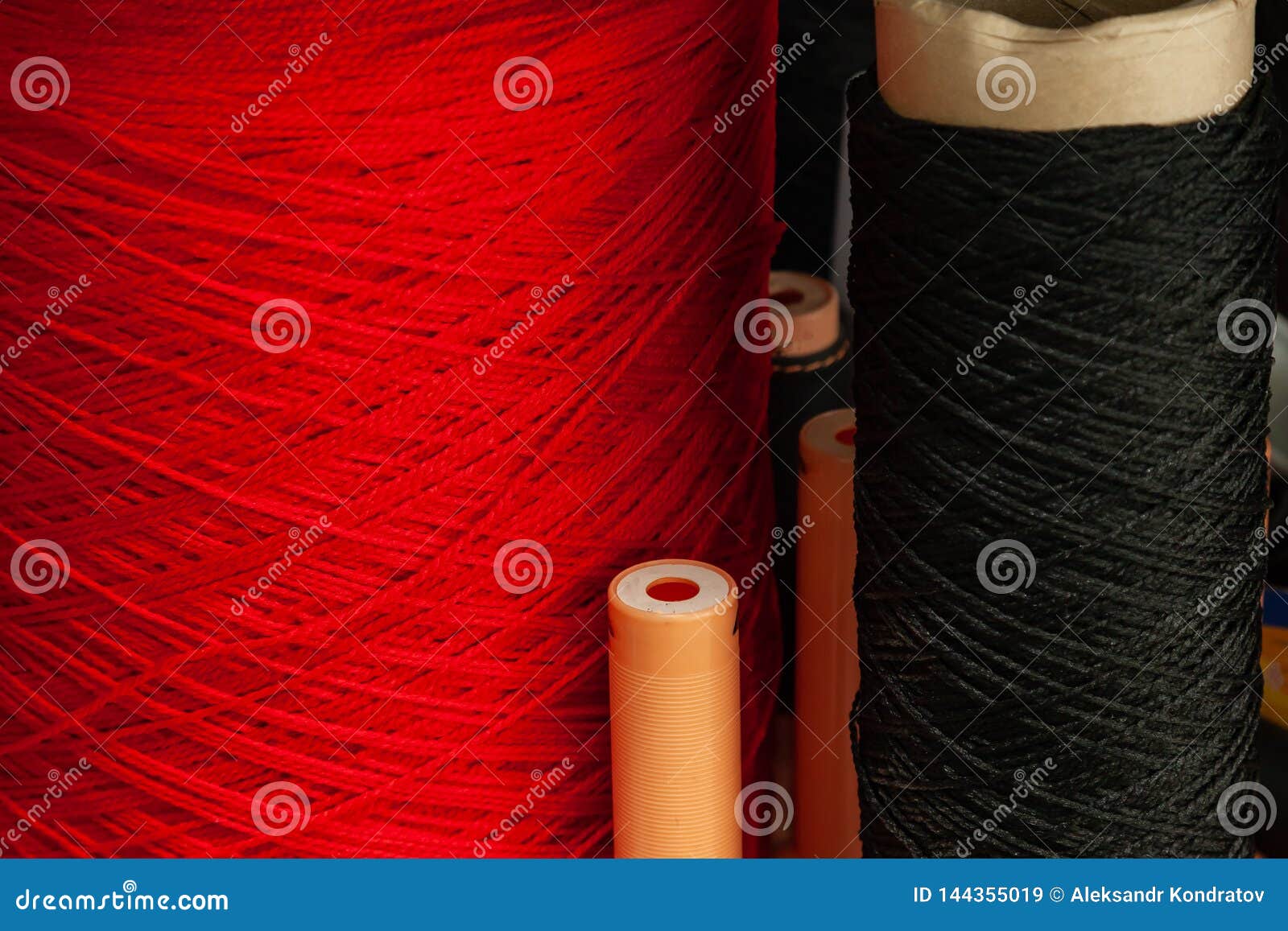 Close-up of Two Coils with Thick Threads of Red and Black for ...