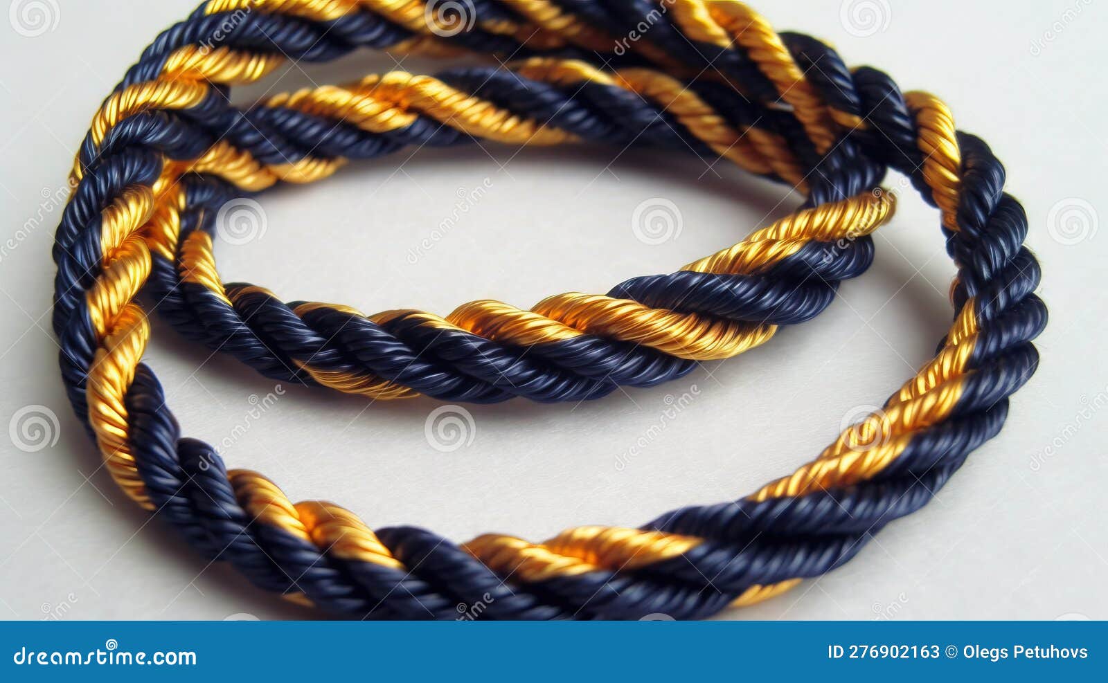 A Close Up of Two Different Colored Ropes on a White Surface Stock ...