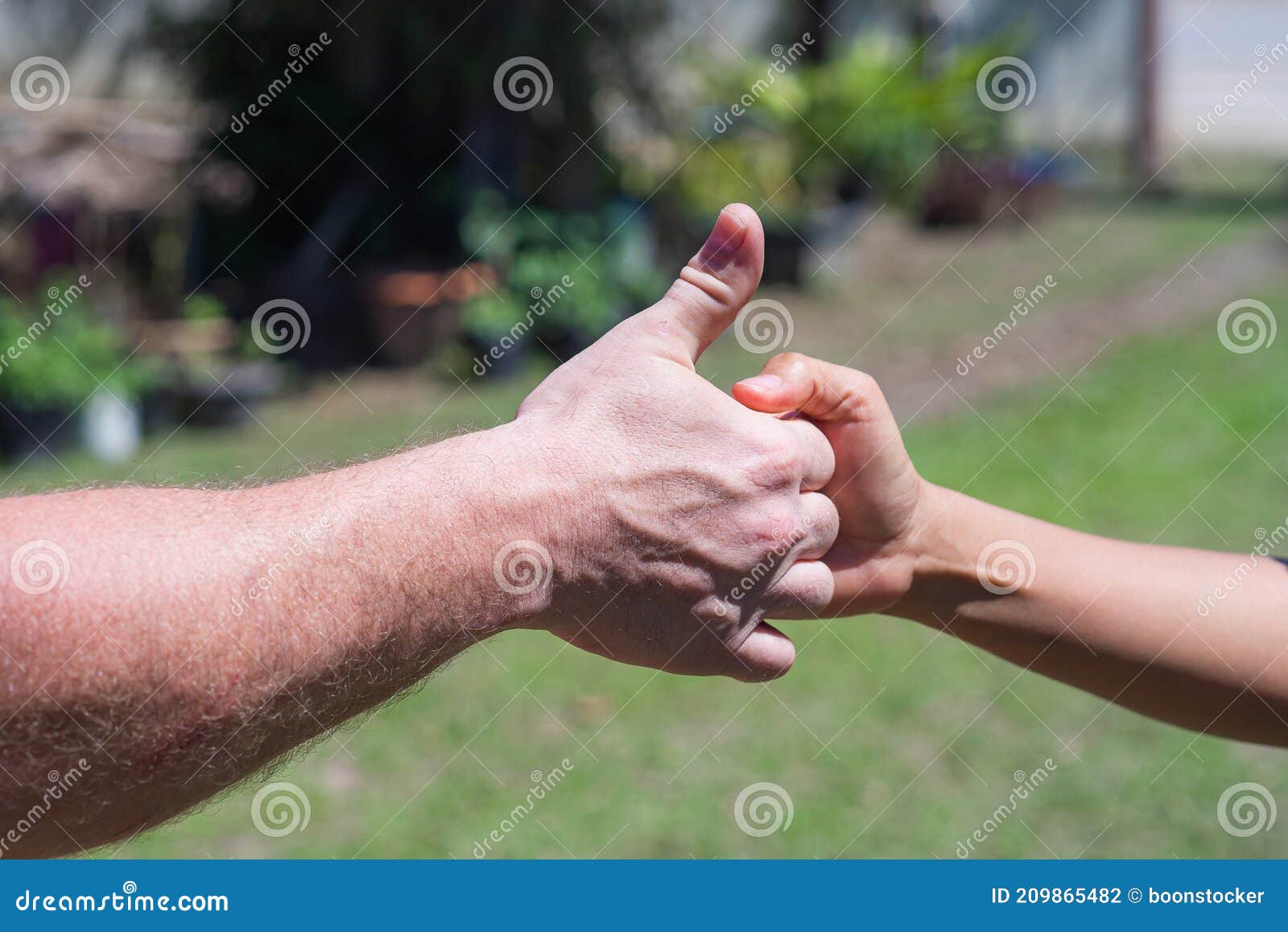 Close-up of Two Hands Showing Signals of Success and Good Stock Photo ...