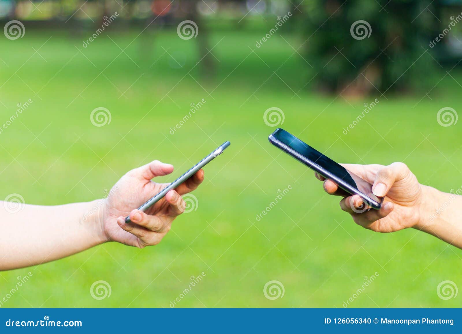 Close-up of Two a Man Hands People Using Smartphone. Concept of Social ...