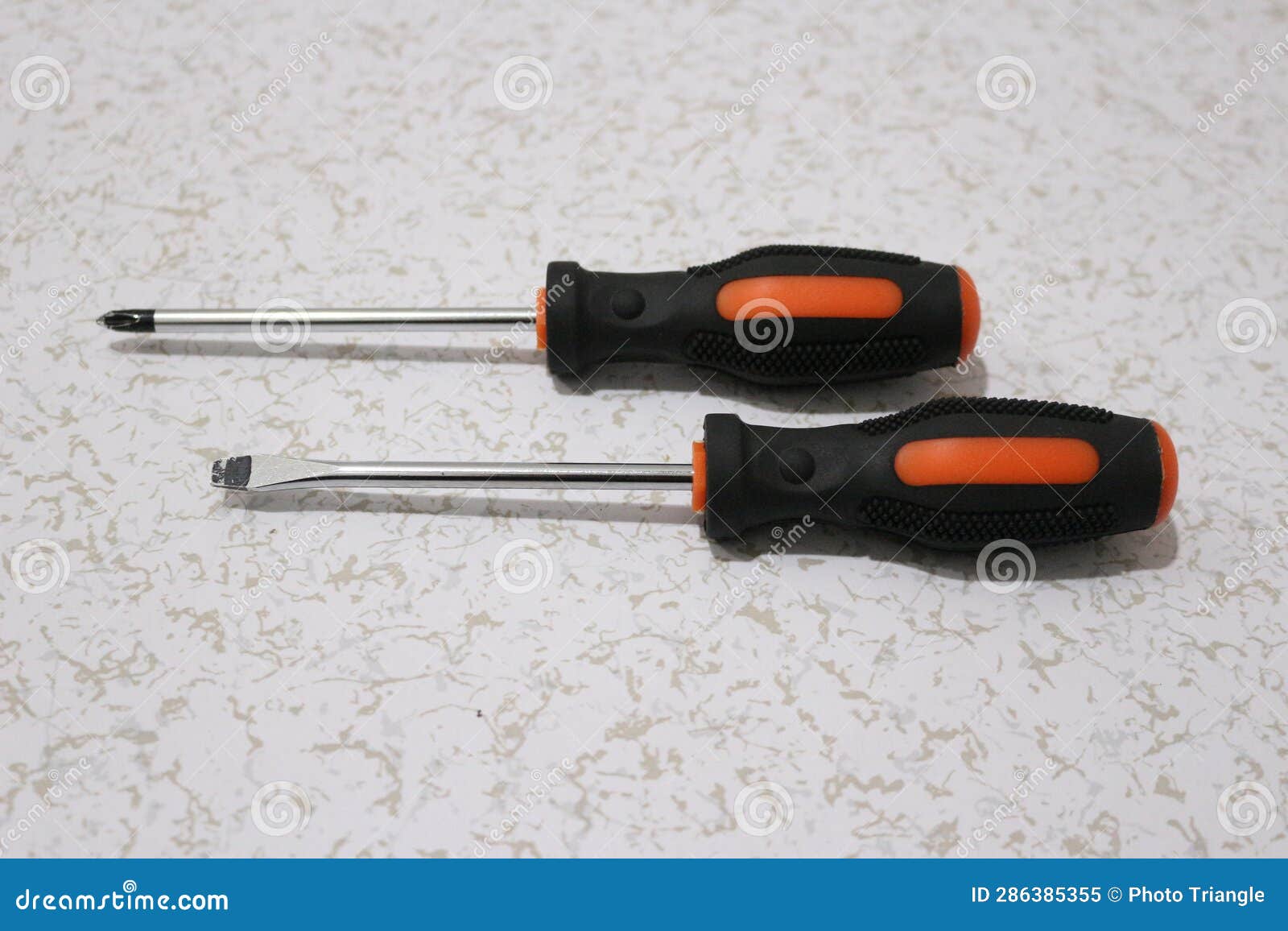 Close-up of a Two Orange Screwdriver Stock Image - Image of orange ...