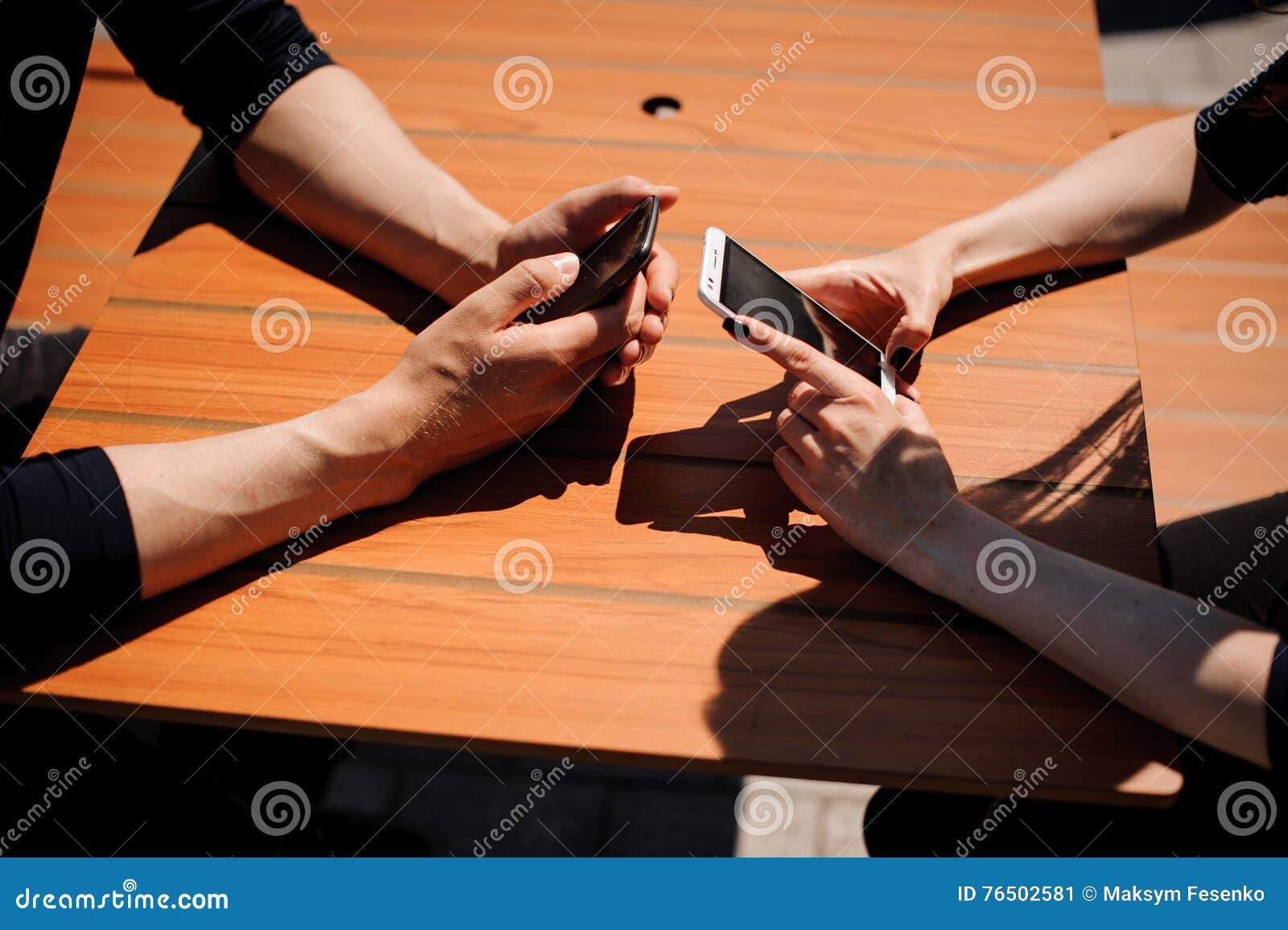 Close-up of Two People Hands with Mobile Phones Stock Image - Image of ...