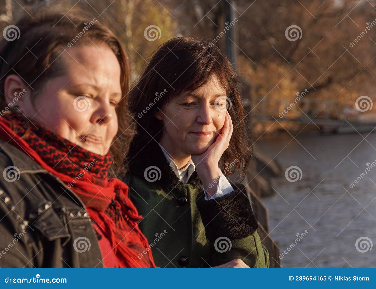 Close-up of Two People Looking Away Stock Image - Image of tourism ... Close-up of Two People Looking Away Stock Image - Image of tourism ...