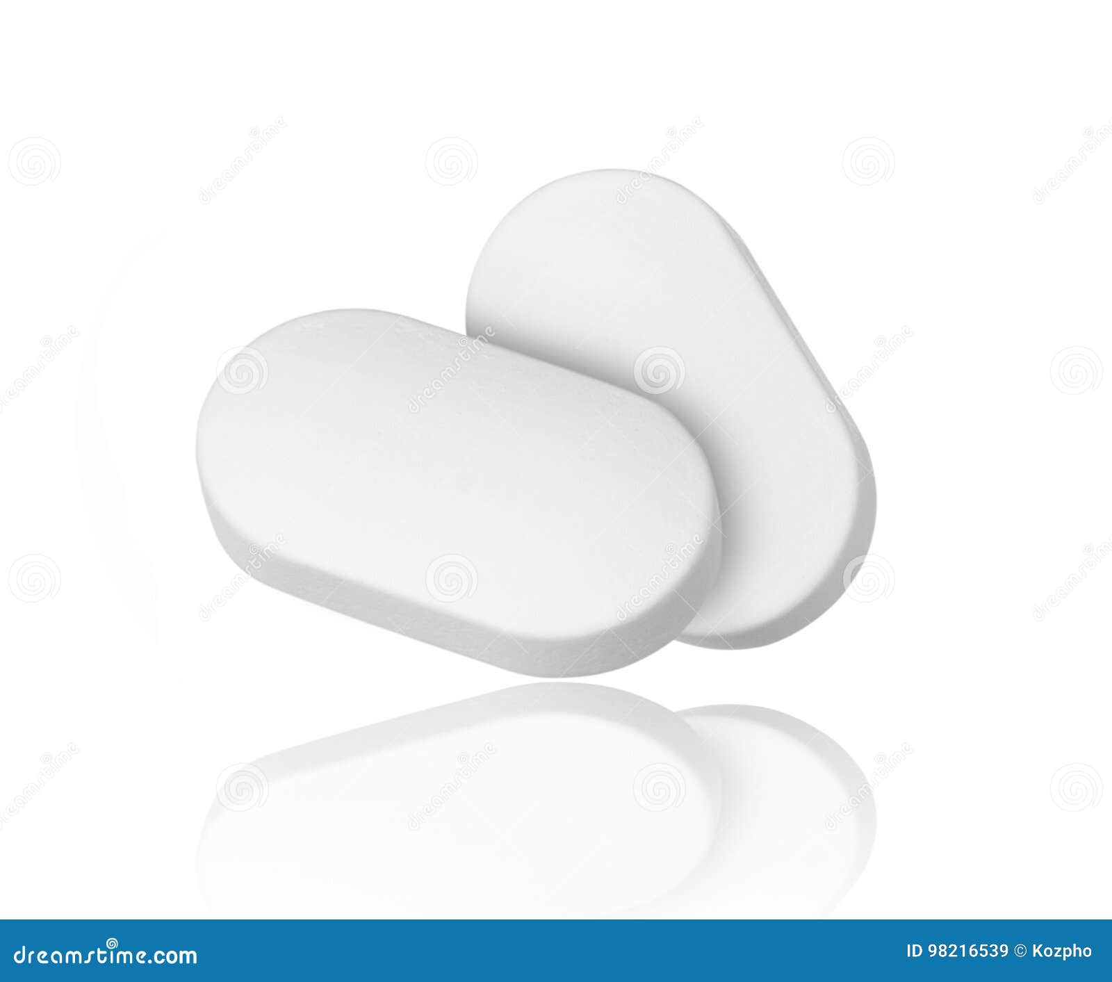 Close-up of Two Pills Isolated on White Background Stock Image - Image ...