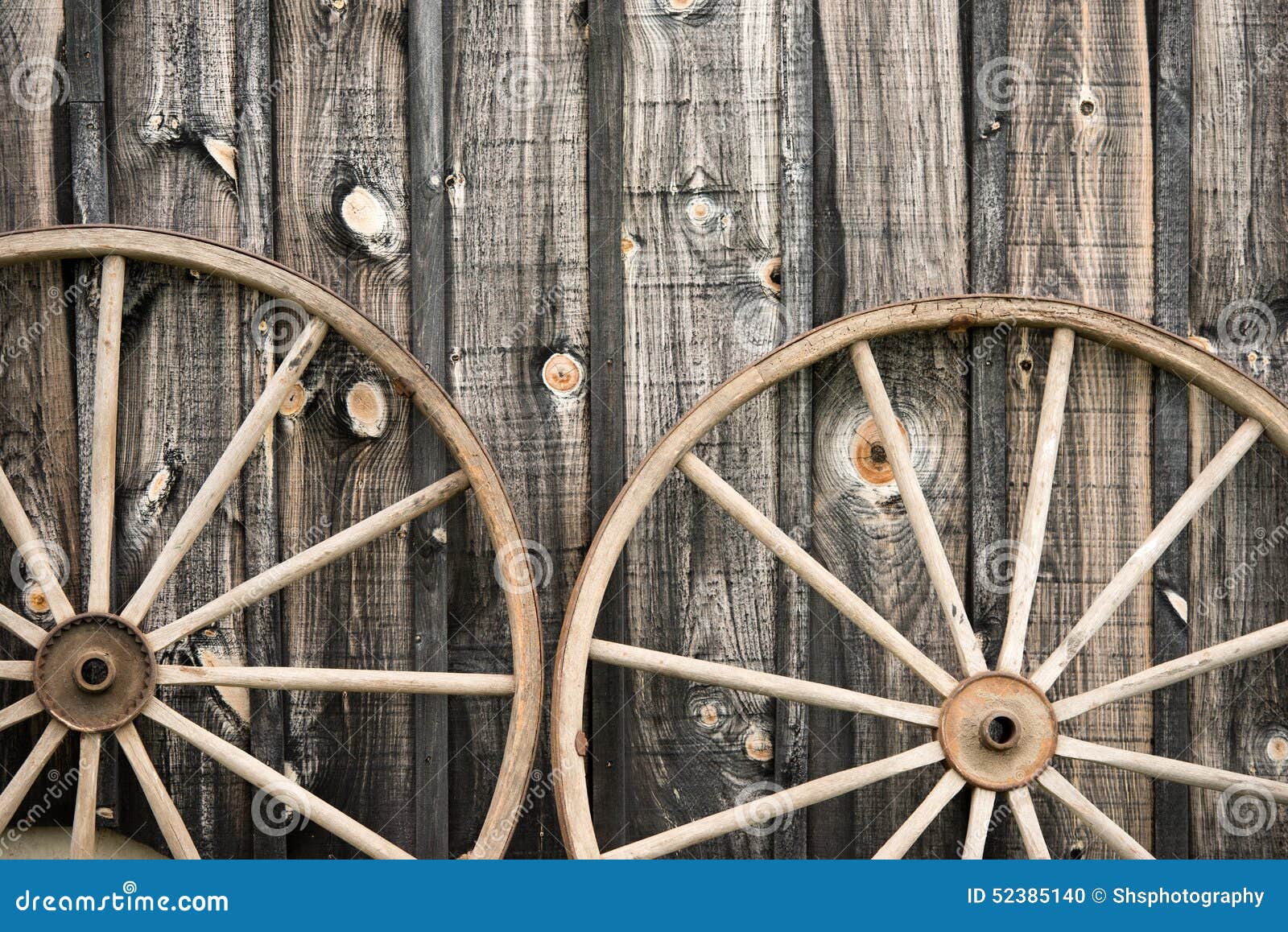 Close Up of Two Wagon Wheels Stock Photo - Image of object, used: 52385140