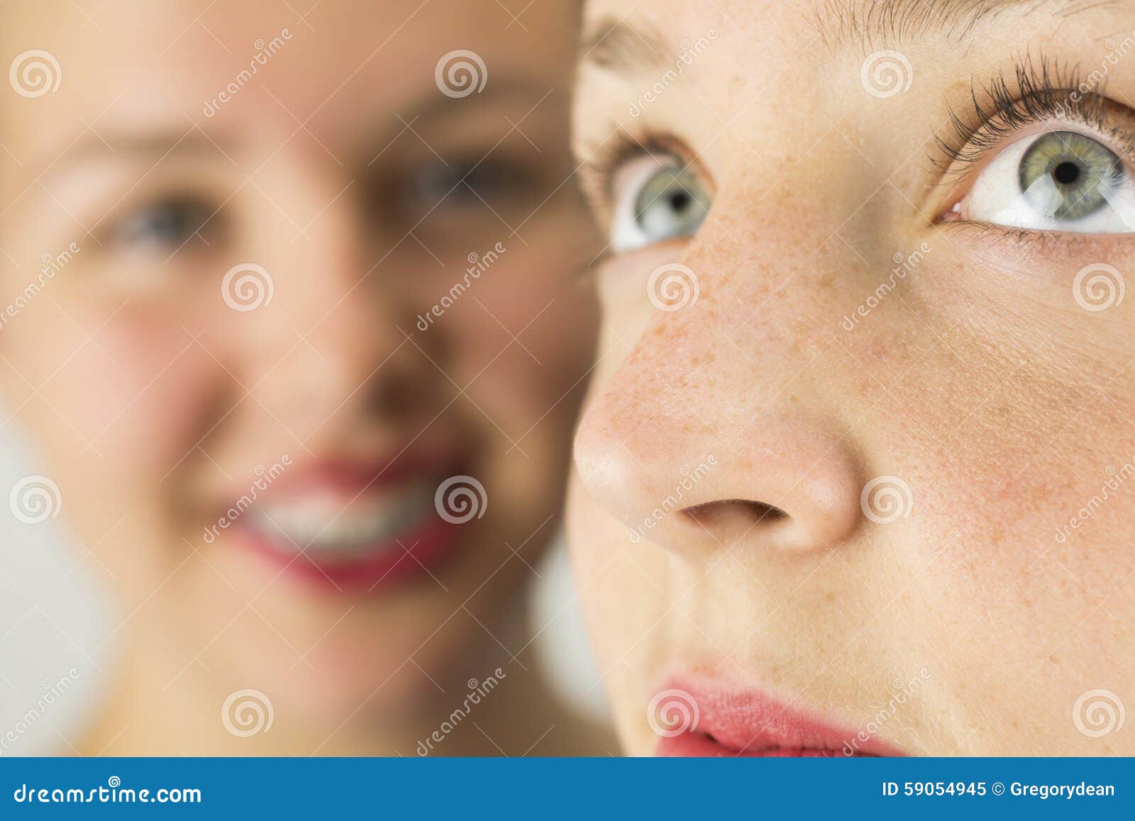 Close Up of Two Young Girls Faces Stock Image - Image of girl, brown ...