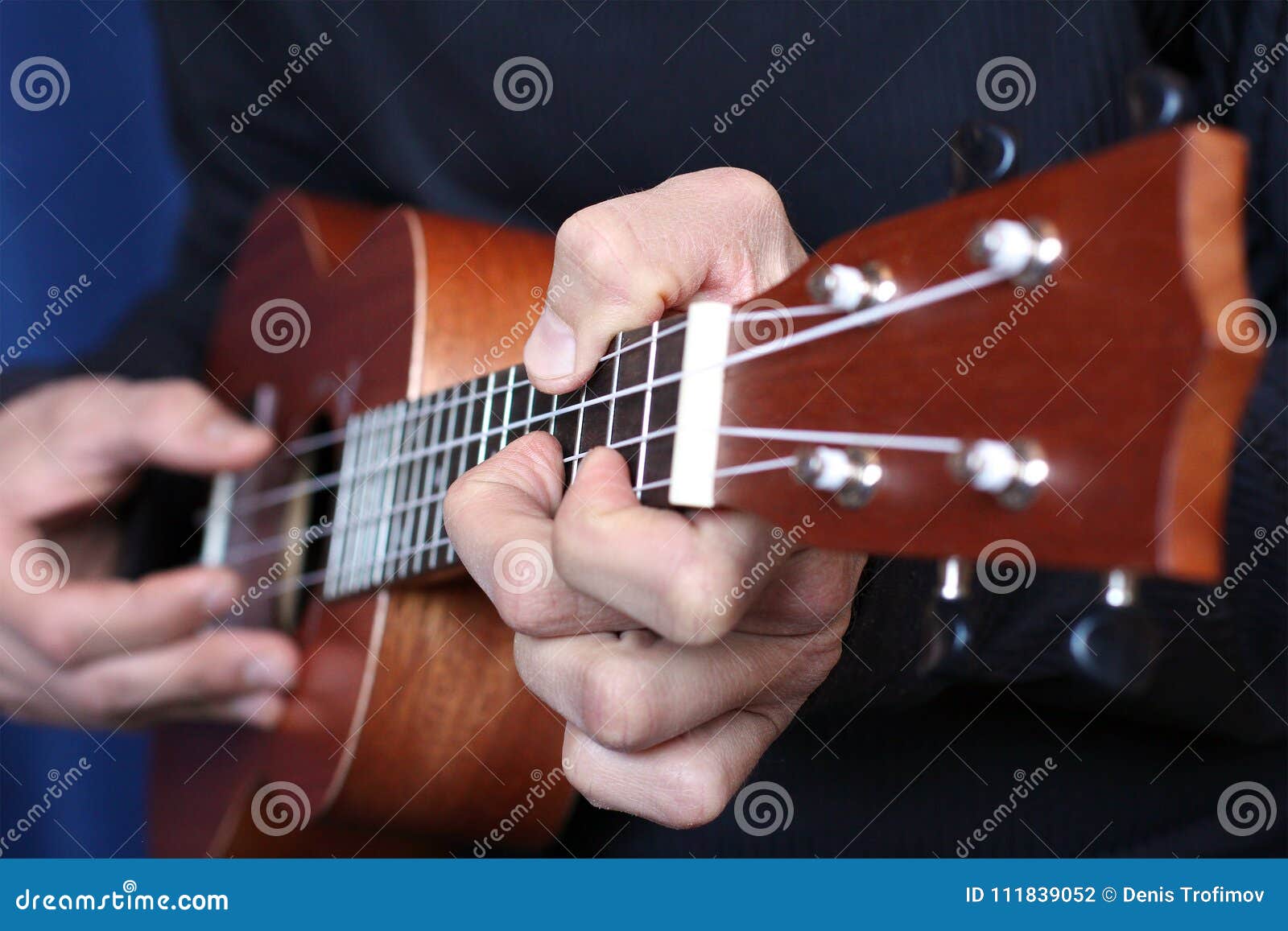 Close Up Ukulele in Musician Hands, Left Hand View Stock Photo - Image ...