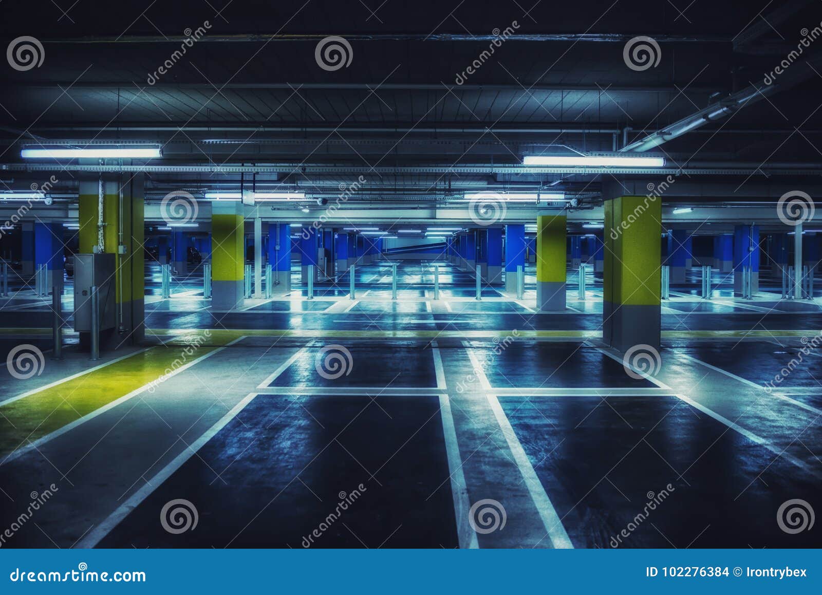 Close Up on Underground Parking with Empty Slots Stock Photo - Image of ...