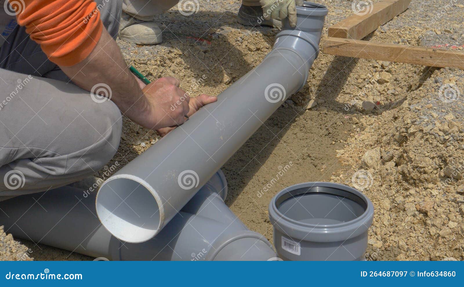 CLOSE UP: Unrecognizable Builder Marks a Plastic Sewage Pipe with a ...