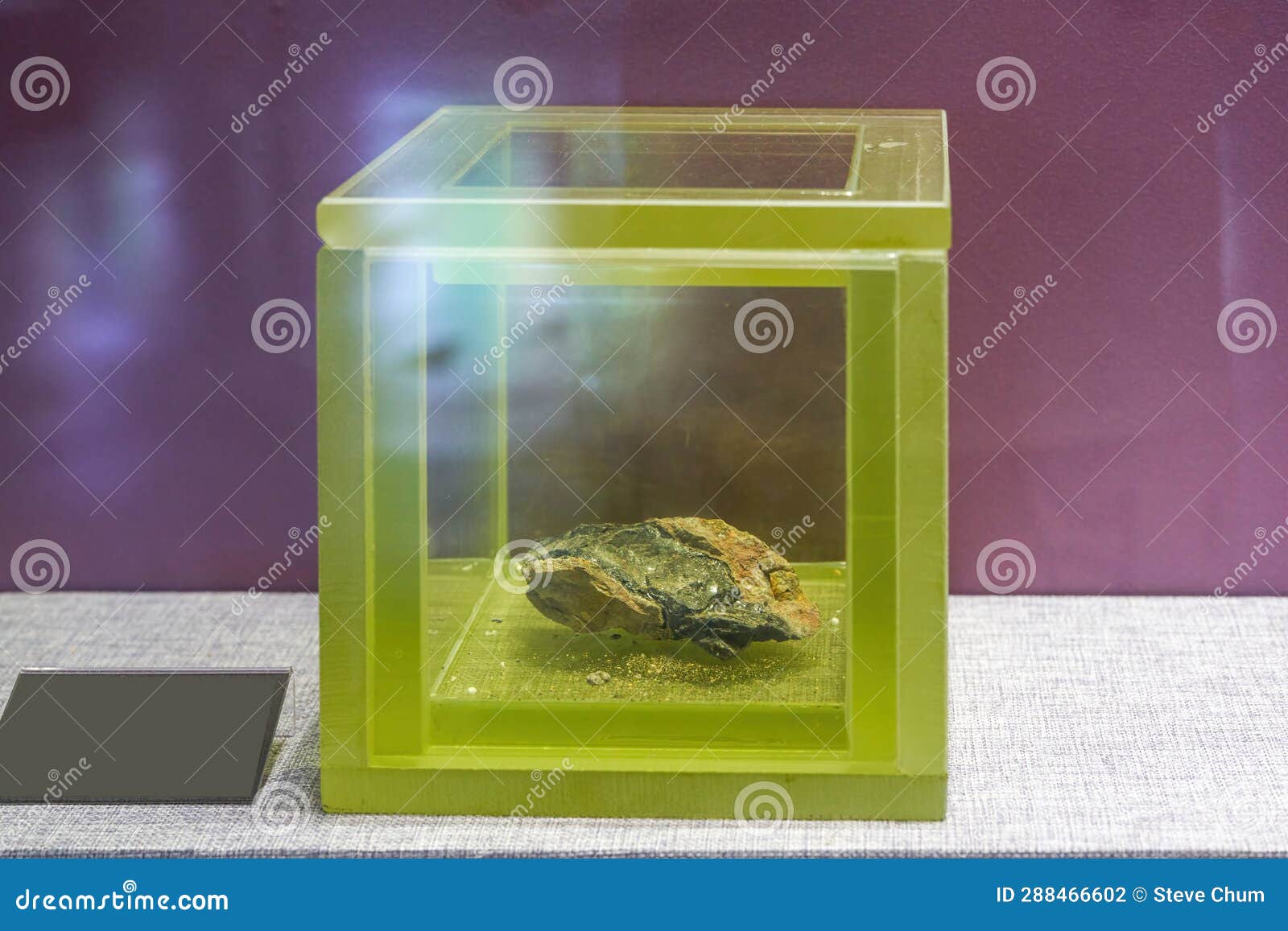 Close-up of Uranium Ore Stored in a Radiation-proof Glass Container ...