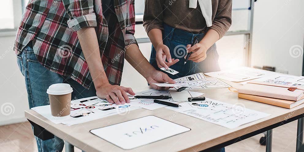 Close Up Ux Developer and Ui Designer Brainstorming Interface Wireframe ...