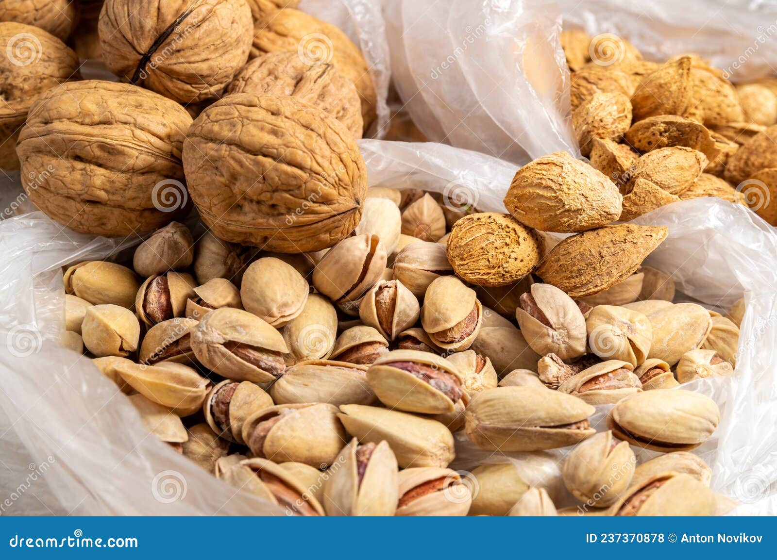 Close Up of Various Nuts in Open Single-use Plastic Bags Stock Photo ...
