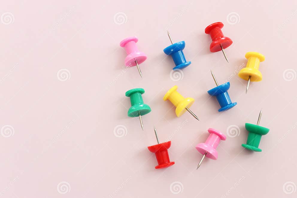 Close Up of Various Pushpins on Pink Background Stock Photo - Image of ...