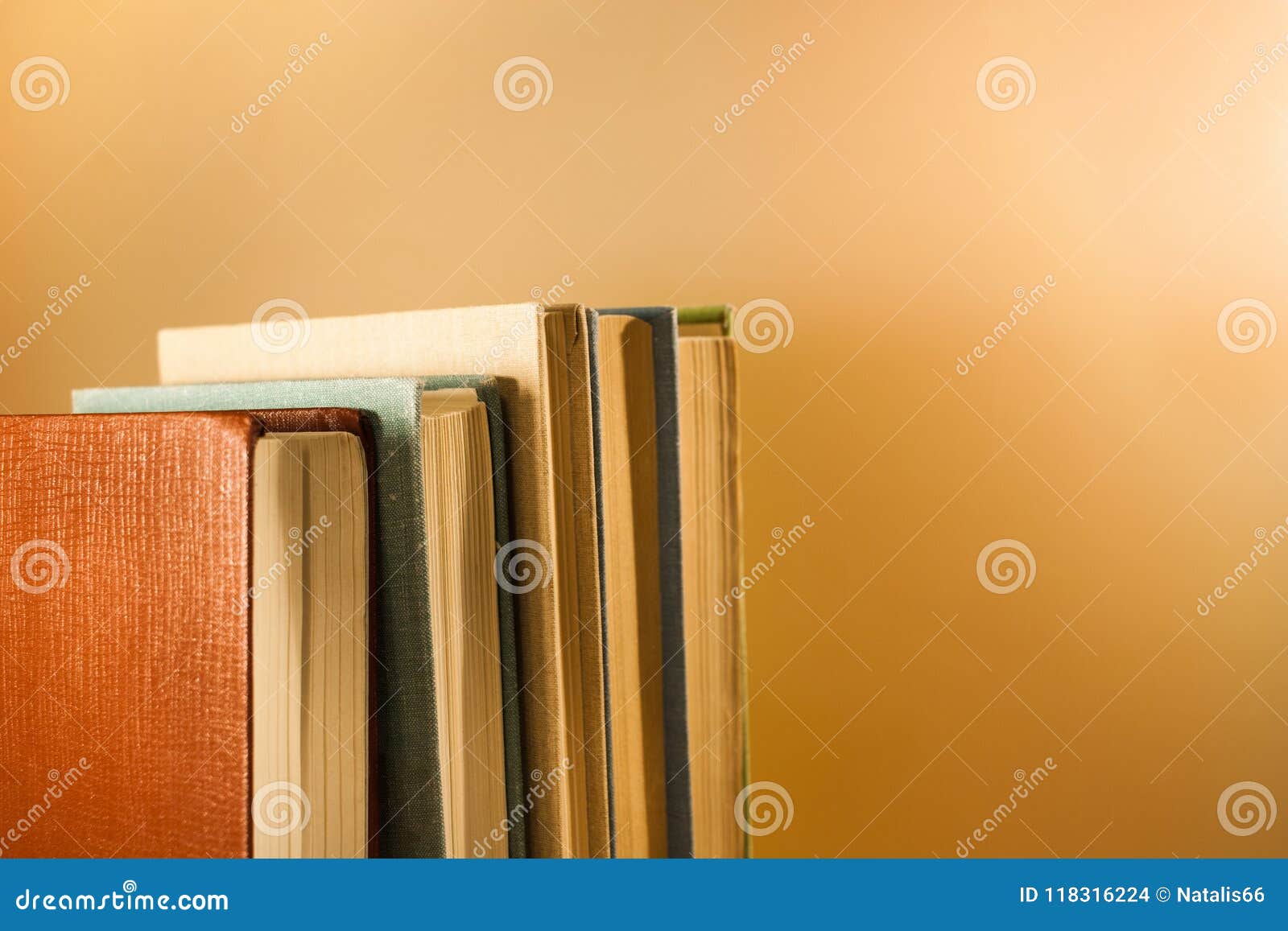 Close-up Vertical Stack of Books on Light Background with Copy Space ...