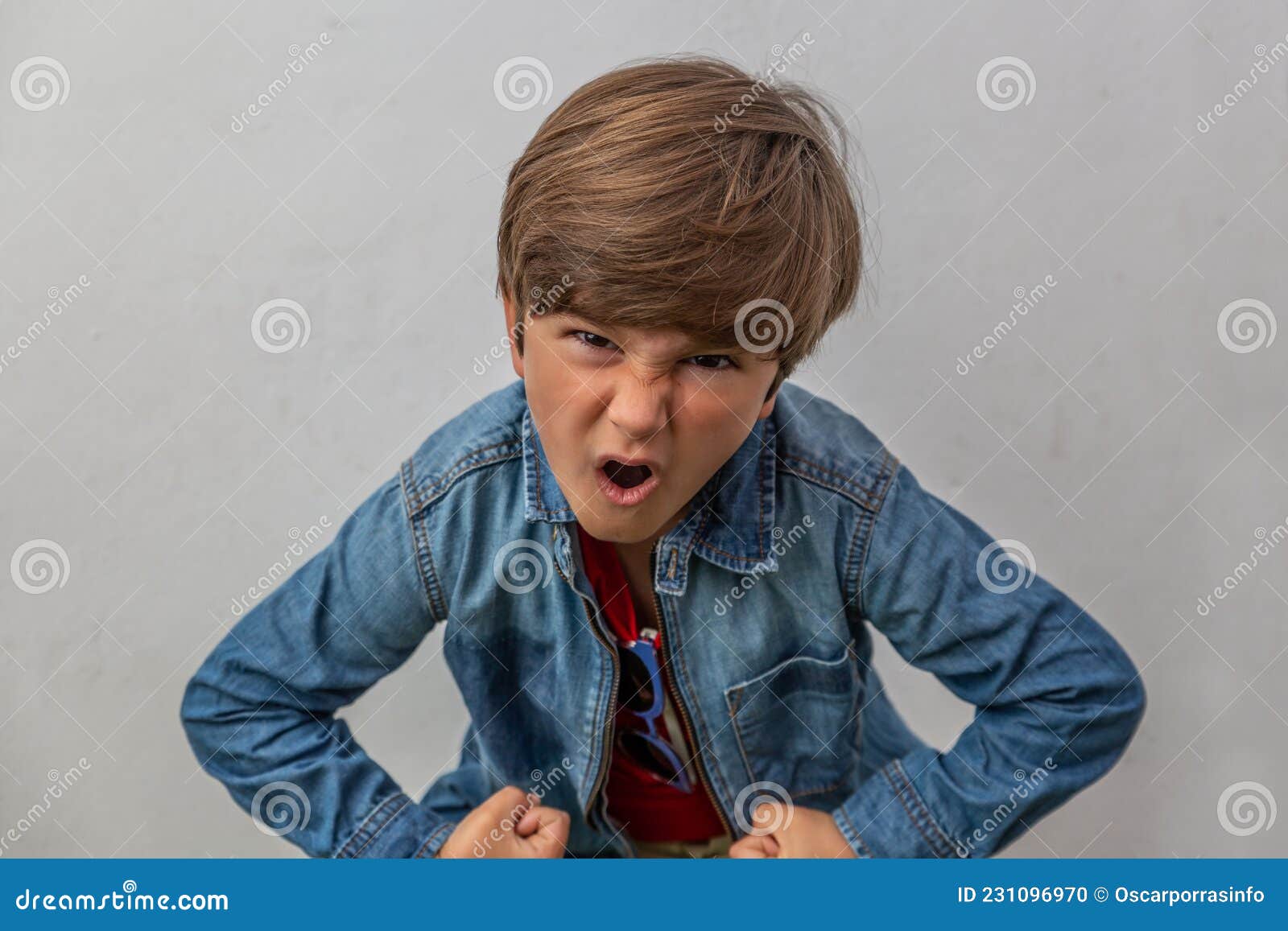 Close-up of Very Angry Boy Dressed in Blue Jacket Stock Photo - Image ...
