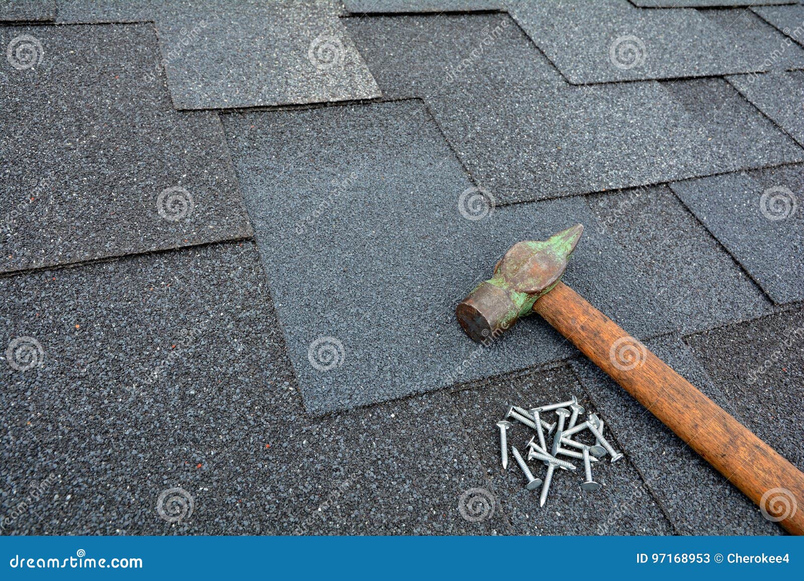 Close Up View on Asphalt Roofing Shingles Background with Hammer and ...