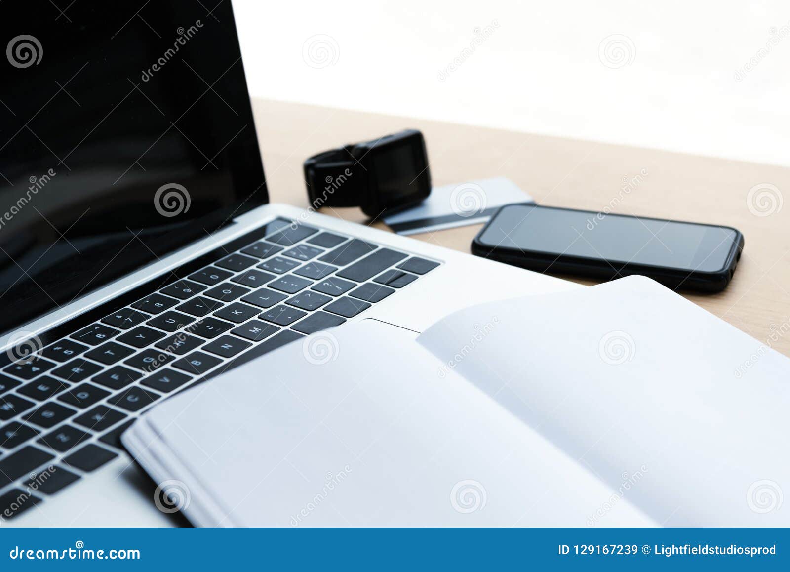 Close-up View of Blank Open Notebook and Digital Devices Stock Image ...