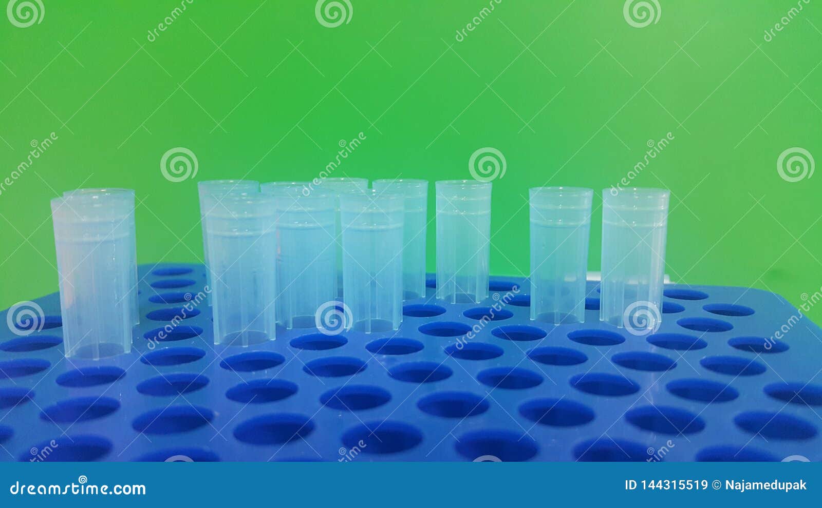 Close Up View of Blue Micro Litre Tips in Microtip Box with Empty Holes ...