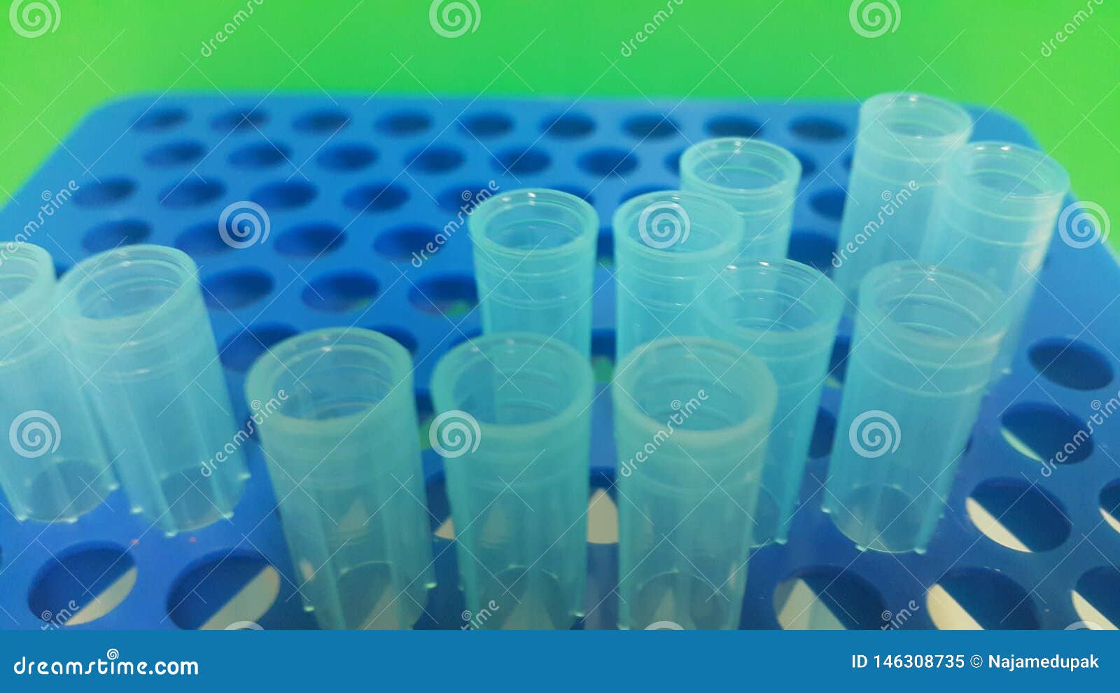 Close Up View of Blue Micro Litre Tips in Microtip Box with Empty Holes ...