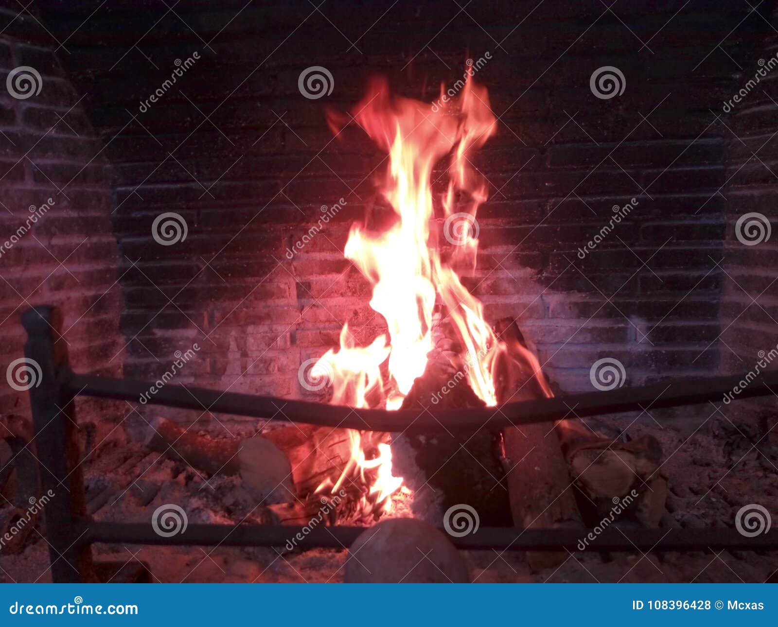 Bonfire in the fireplace stock photo. Image of friendly - 108396428