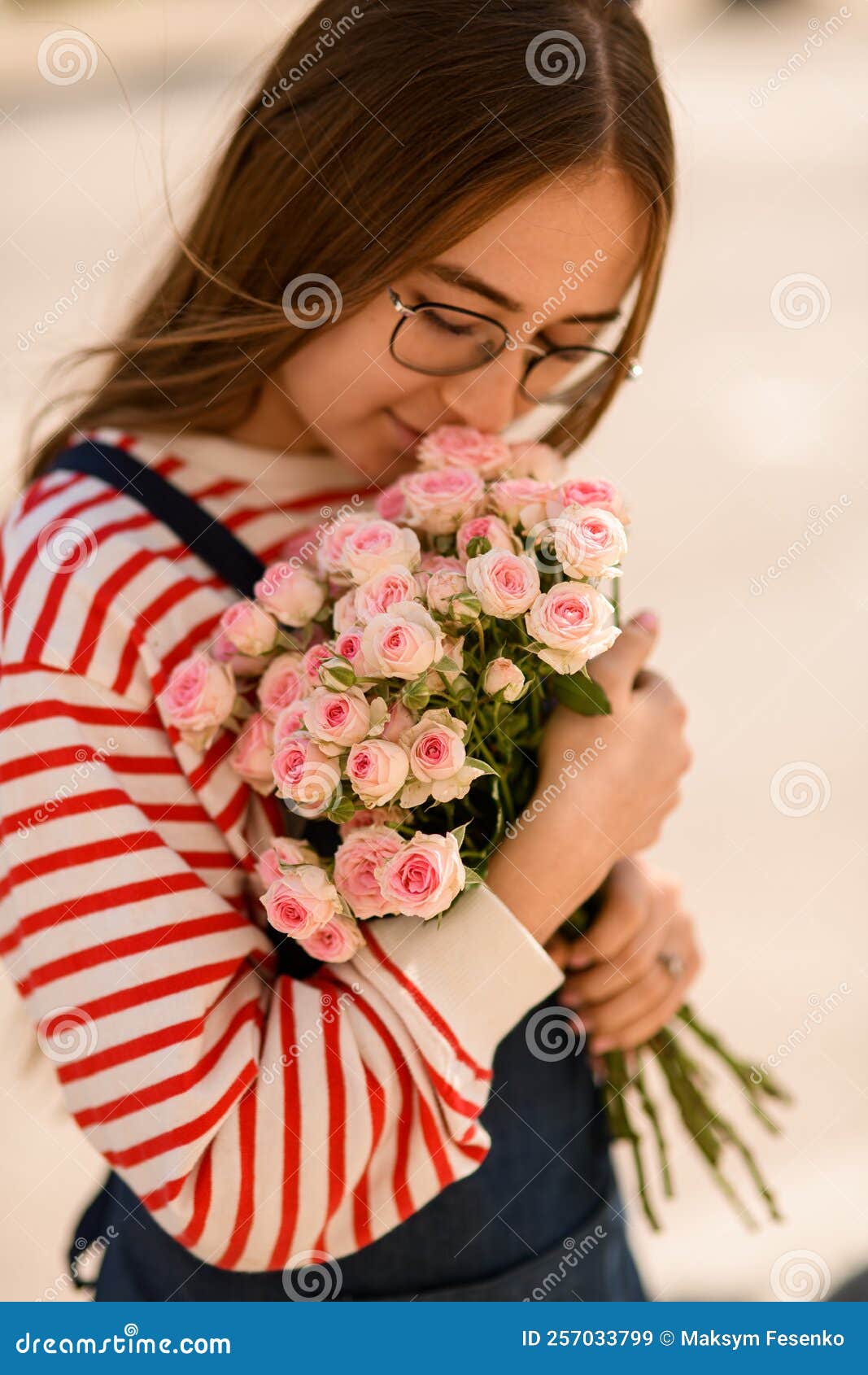 Close-up View of Bouquet of Light Pink Roses Flowers Which Woman ... Close-up View of Bouquet of Light Pink Roses Flowers Which Woman ...