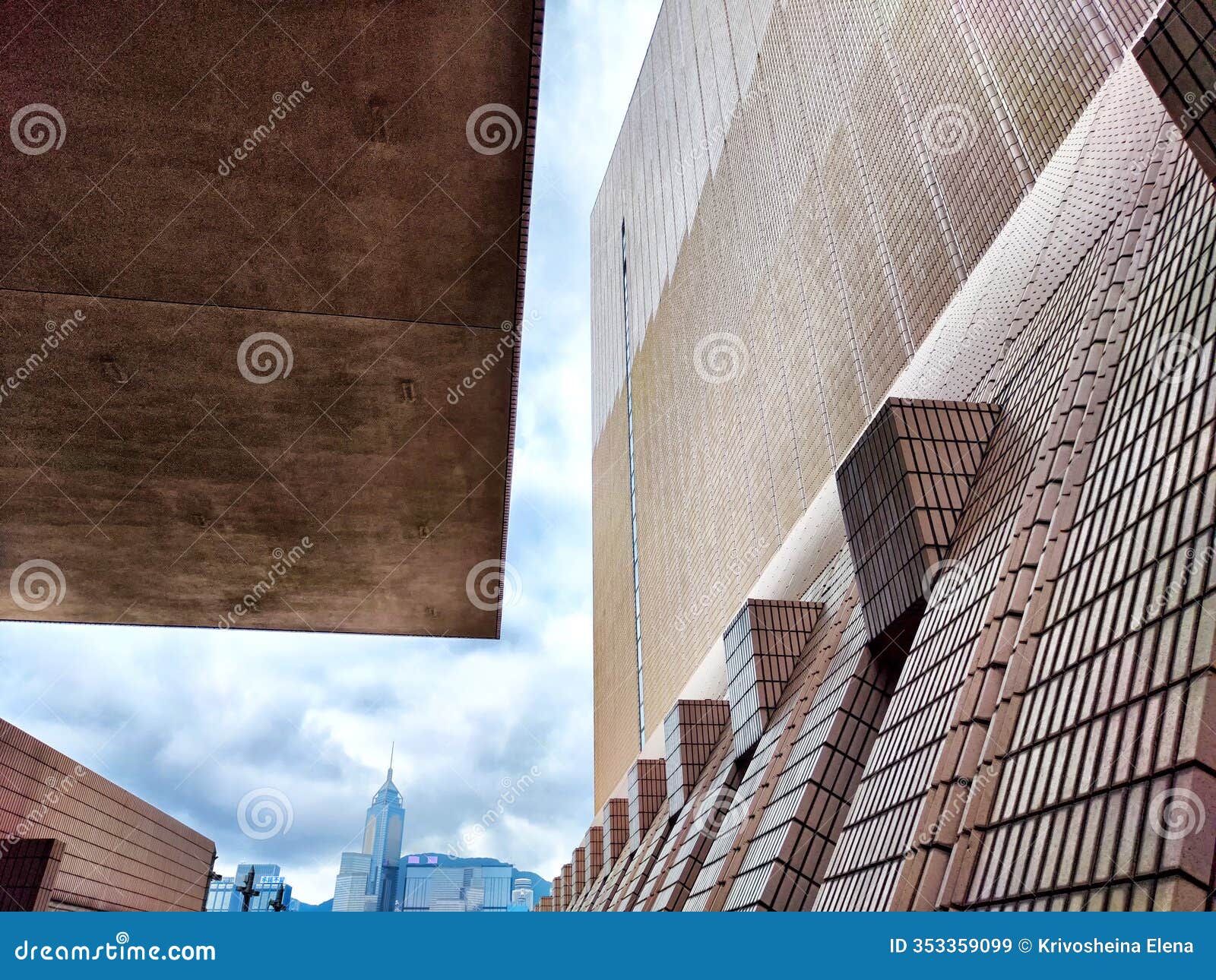 A Close-up View of a Brick-patterned Building Facade with an ...