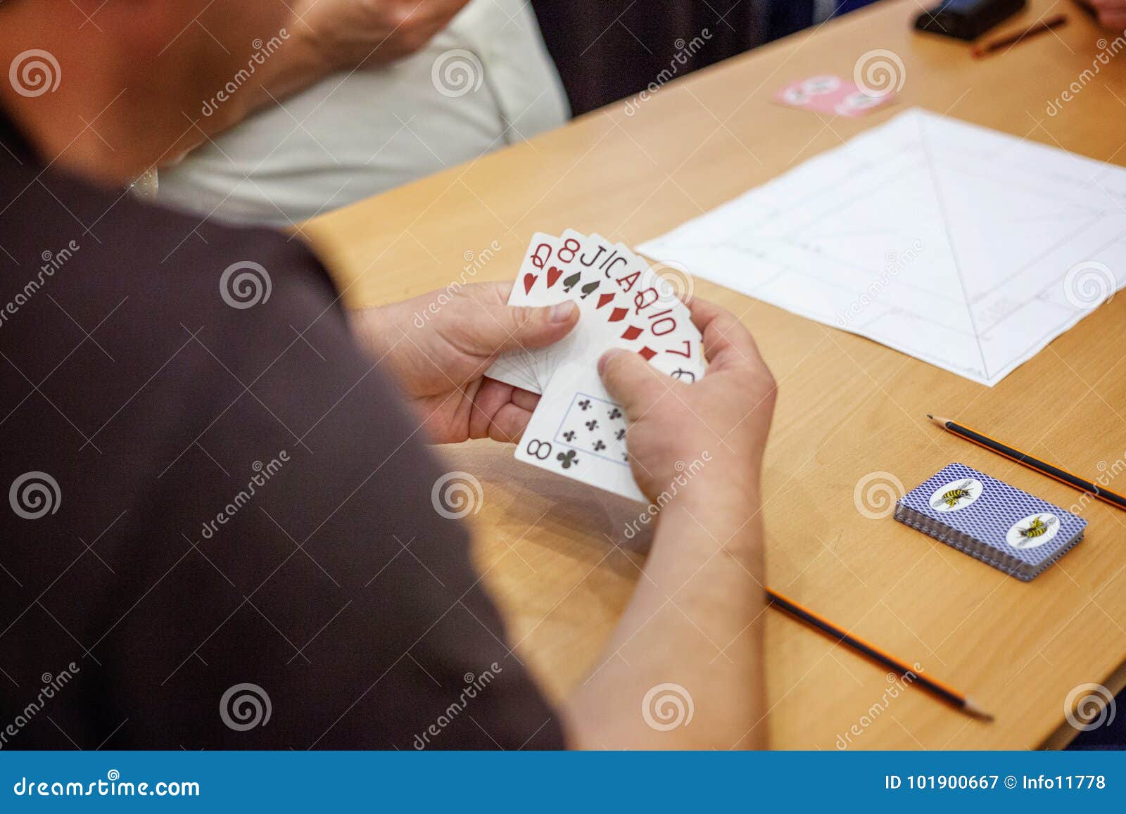 People play cards stock image. Image of asian, casinodots - 101900667