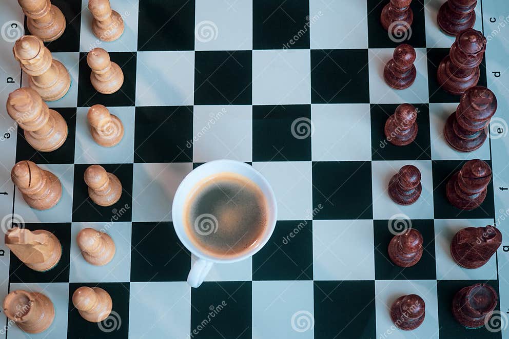 Close-up View of Chess Board with Pieces and Cup of Coffee Stock Photo ...