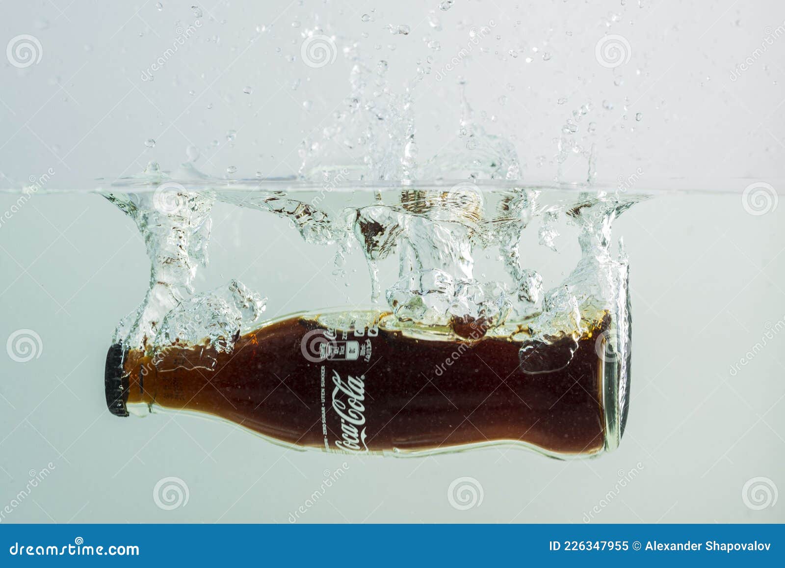 Close Up View of Coca Cola Bottle â€‹falling in Water Editorial Image ...