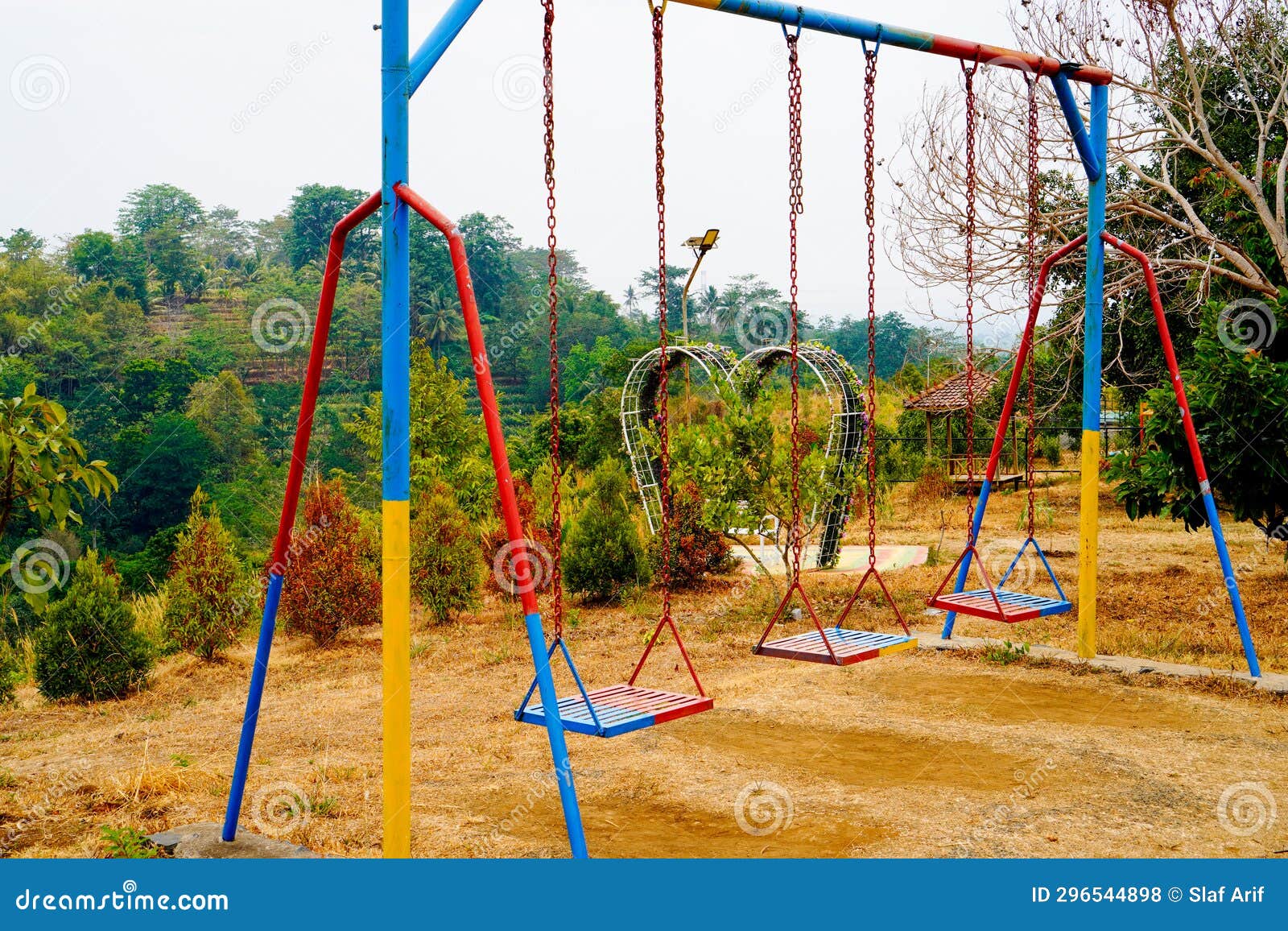 A Close-up View of the Colorful Swings. Stock Photo - Image of cute ...
