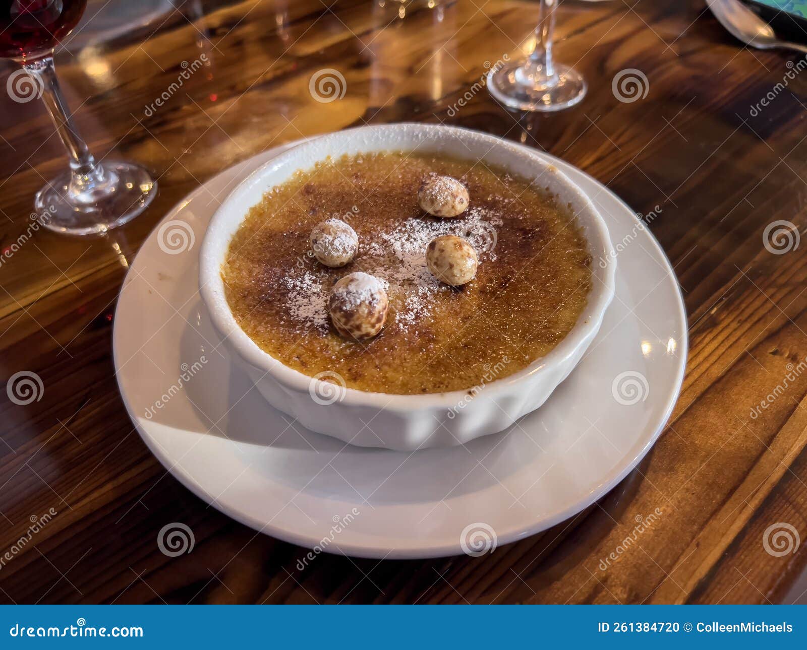 Close Up View of Creme Brulee on a White Plate Inside a High End ...