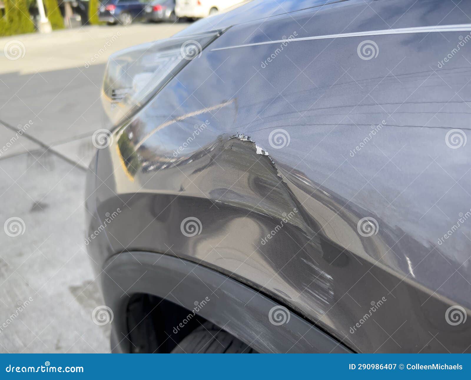 Close Up View of a Dent on the Left Side of a Gray Vehicle Stock Image ...