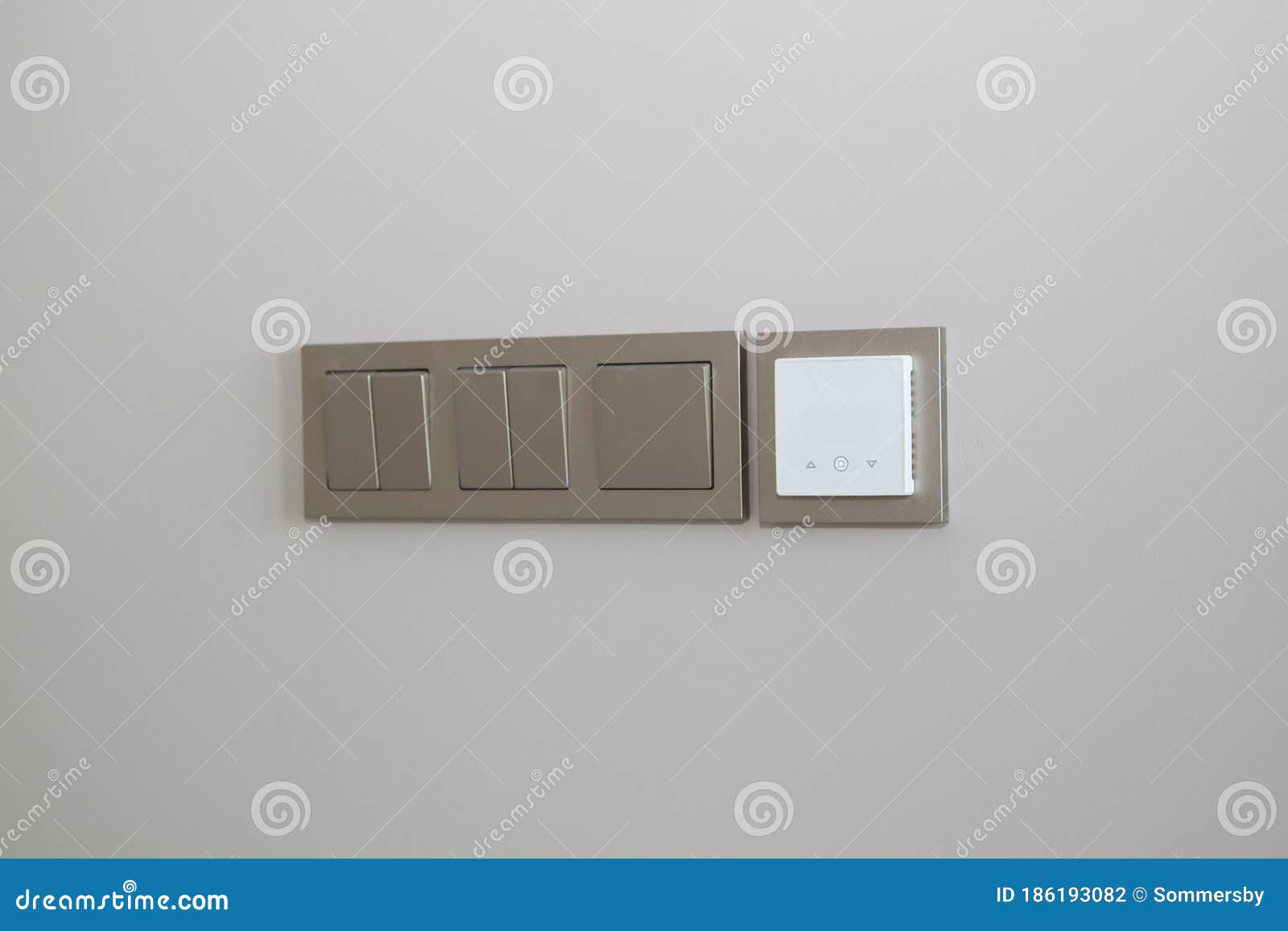 Close Up View of Electric Light Switches and Sensor for Floor Heating ...