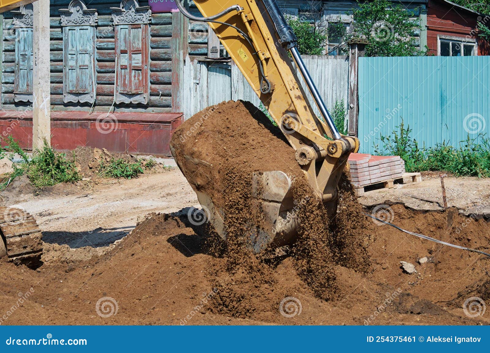 Close Up View of an Excavator Bucket Full of Earth. the Process of ...