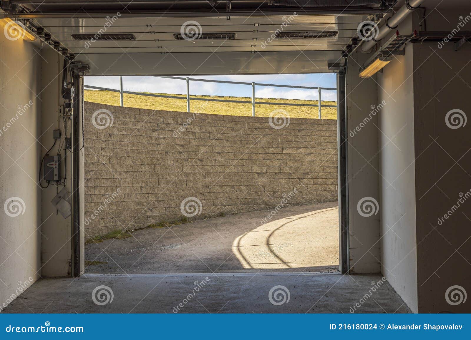Close Up View of Exit from Underground Garage with Automatic Gates ...