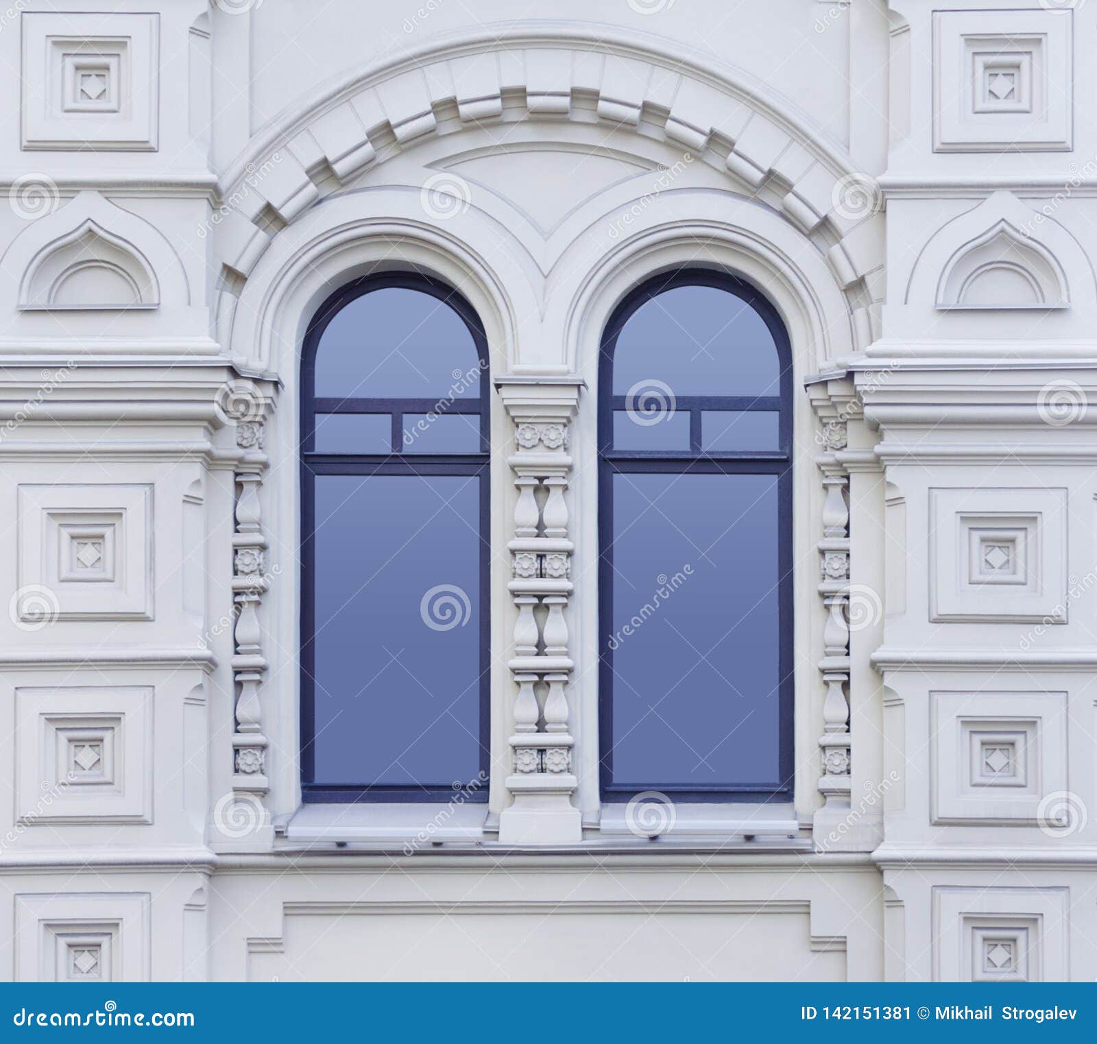 Facade of White Ancient Building with Decorative Ornaments and Two-part ...