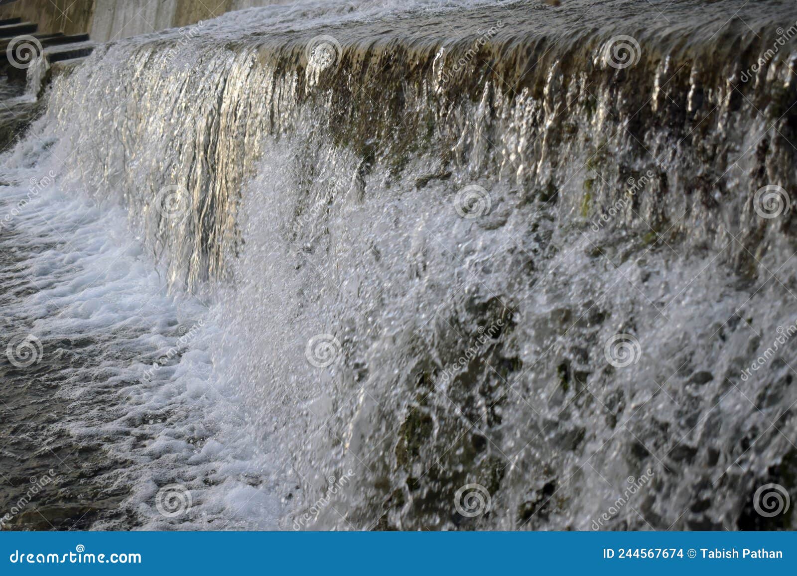 A Close-up View of a Fast Flowing Stream Over the Edge of an Escarpment ...