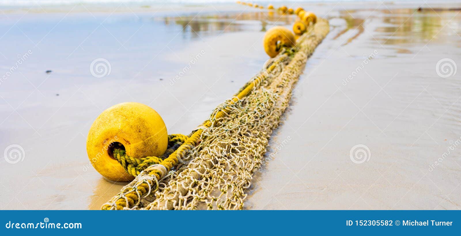 Close-up of Fishing Net on a Sandy Beach Stock Photo - Image of nylon ...