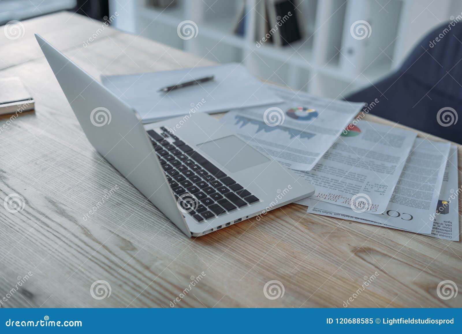 Close-up View of Laptop and Papers on Table Stock Image - Image of ...