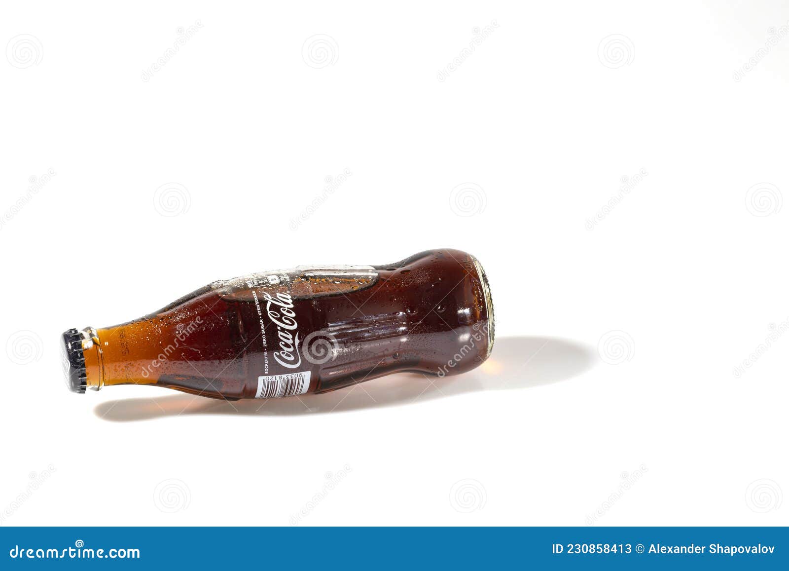 Close Up View of Lying Coca Cola in Glass Bottle Isolated on White ...