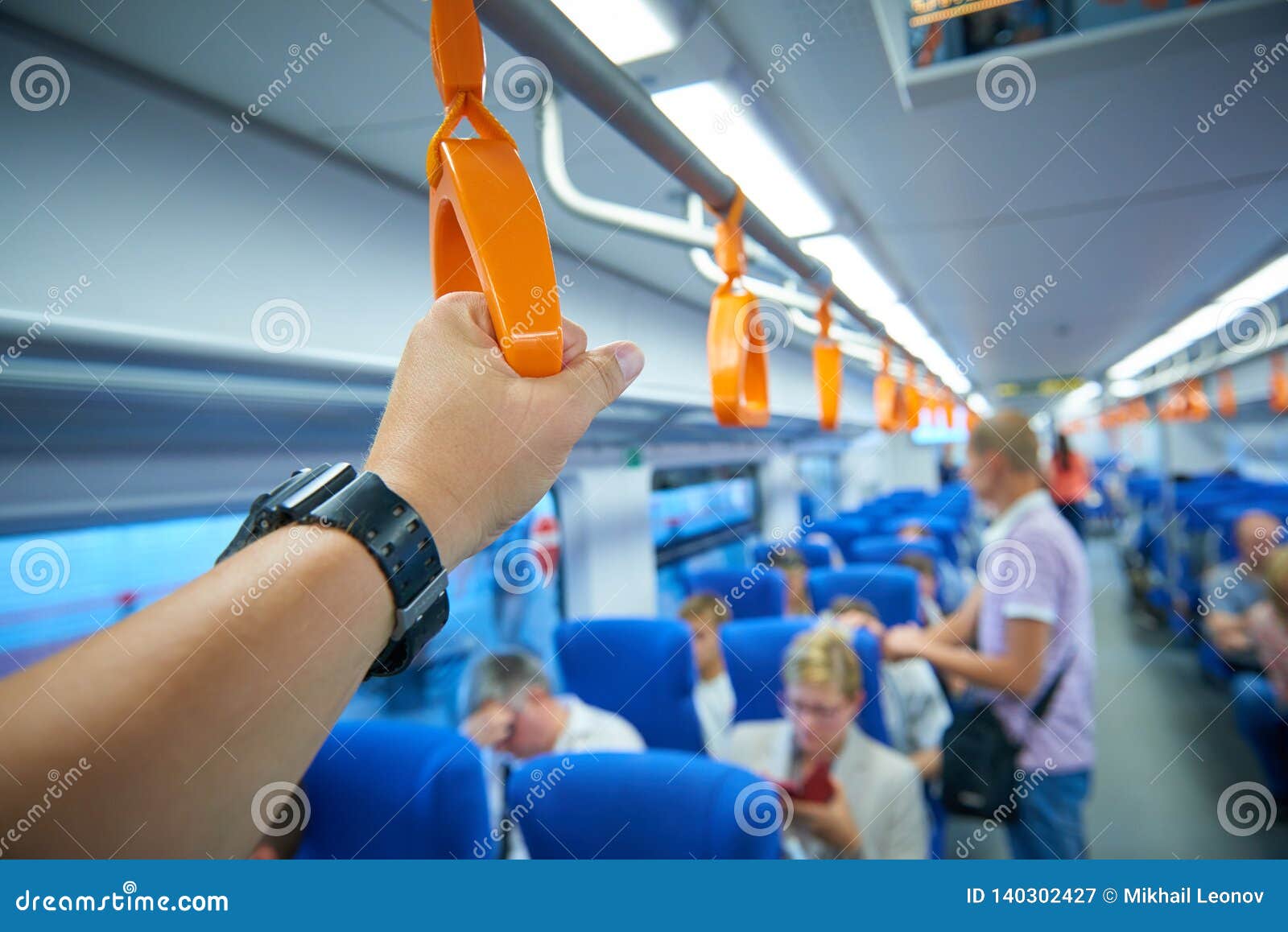 Close Up View On Man Hand Holding The Handle Of Train Handrail And ...