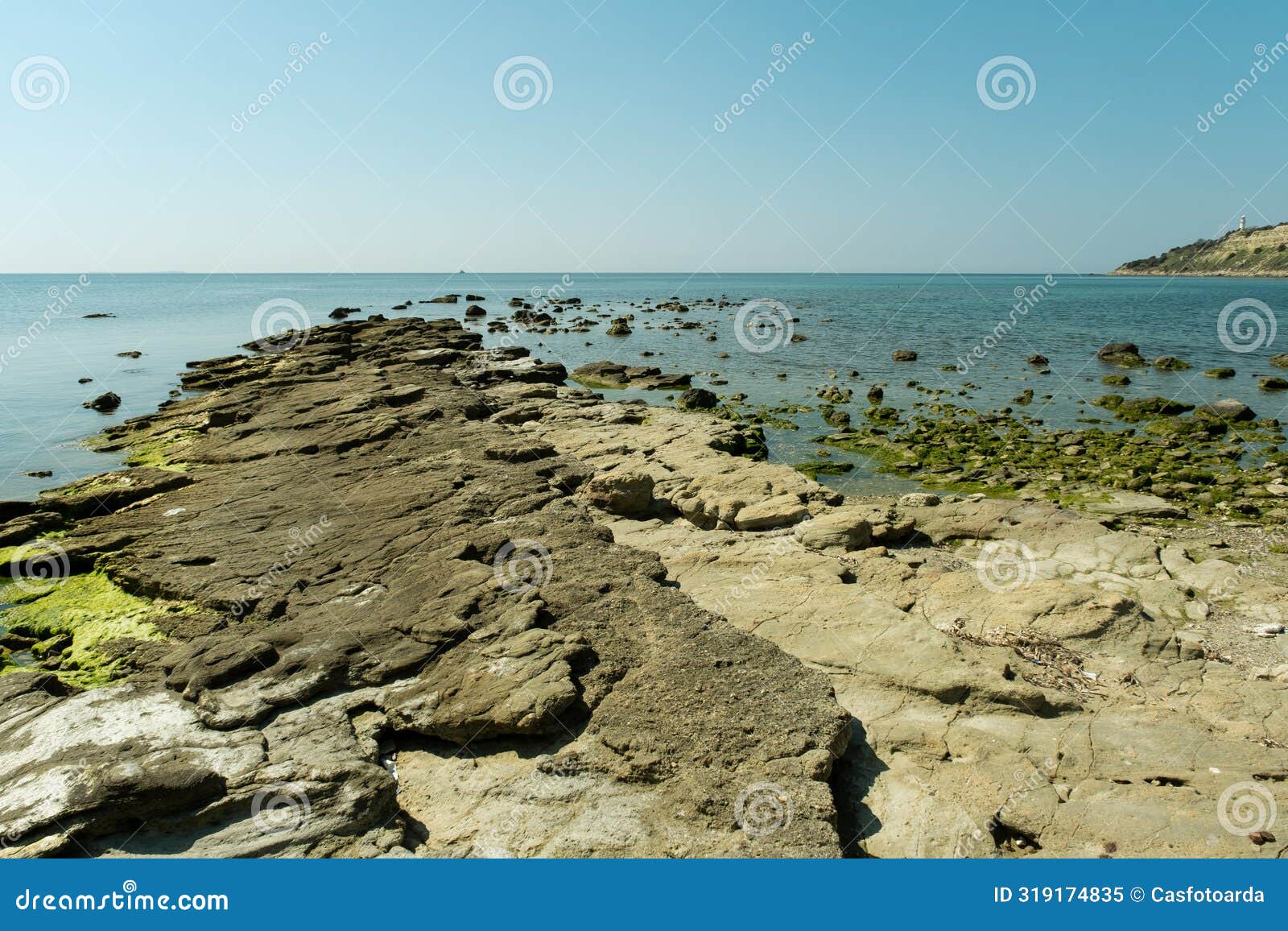 Close-up View of Moss-covered Rocks in the Sea, with Sparkling Water ...