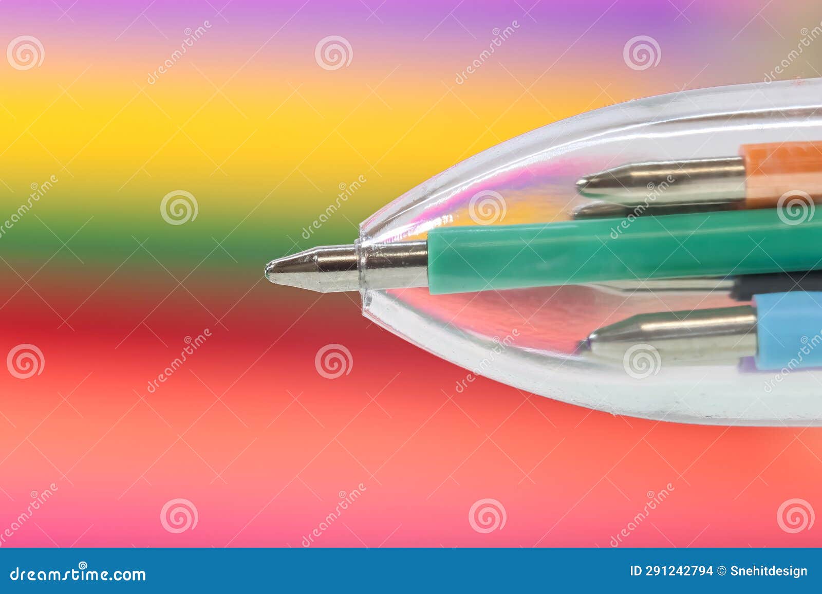 Multi Colored Ball Point Pen Against Colorful Background Stock Photo ...