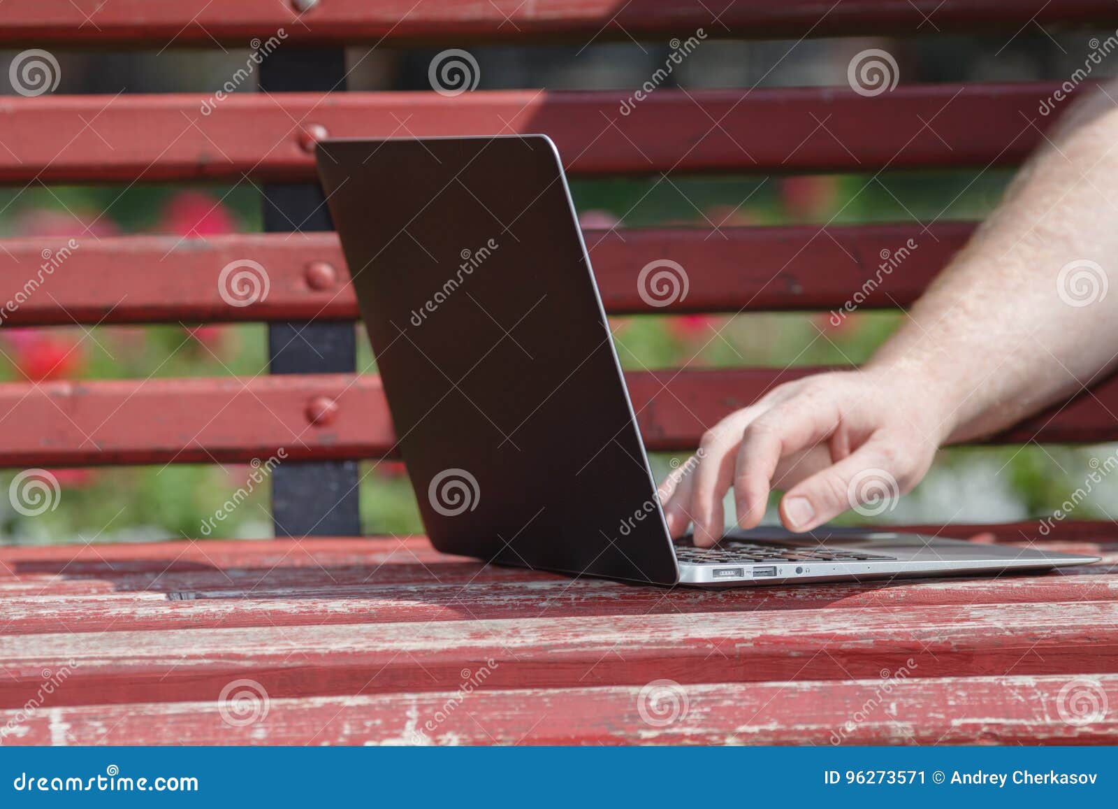 Close Up View of Open Laptop on Bench Stock Image - Image of bokeh ...