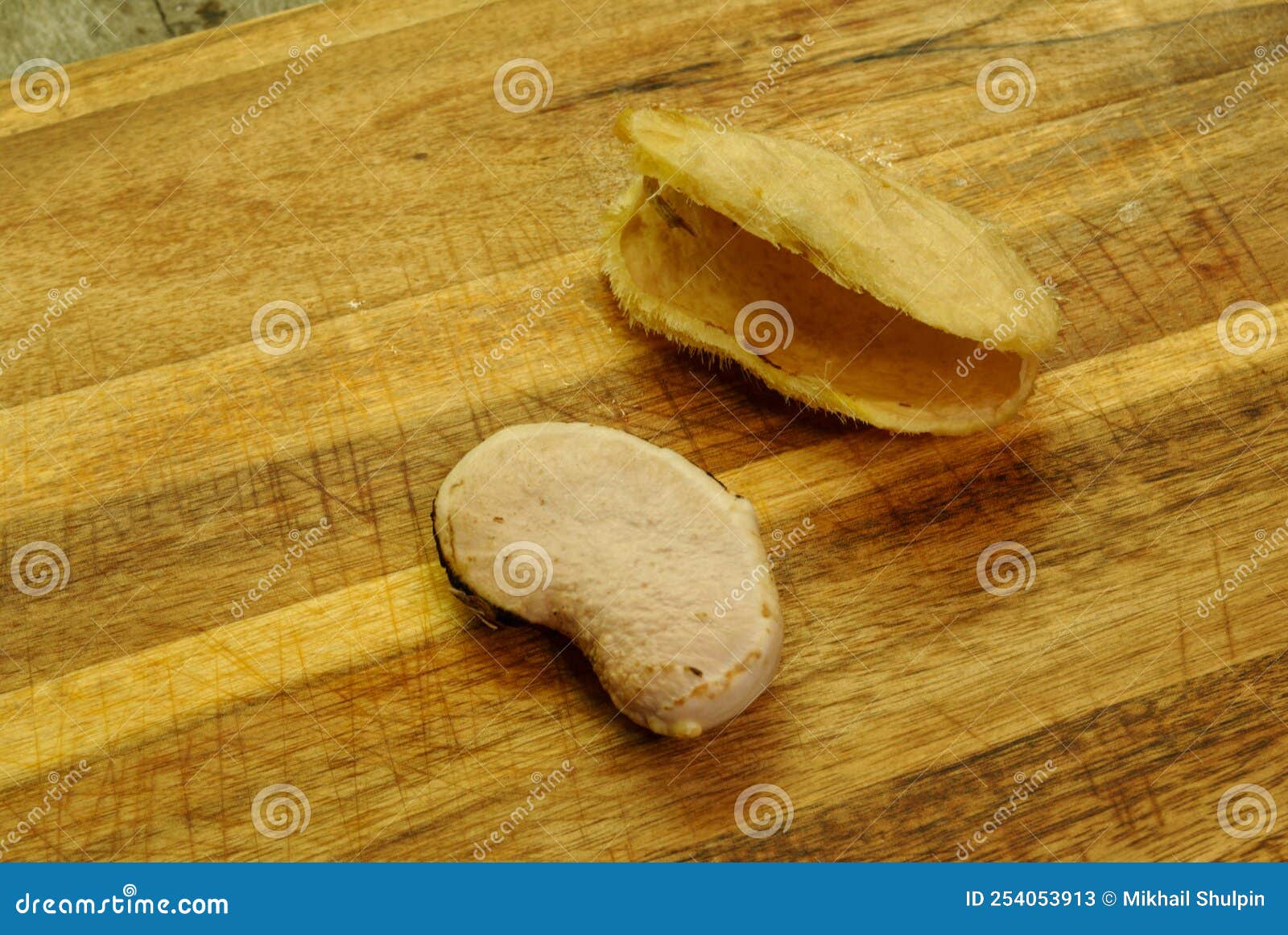 A Close-up View of an Open Mango Stone and a Peeled Seed Extracted from ...