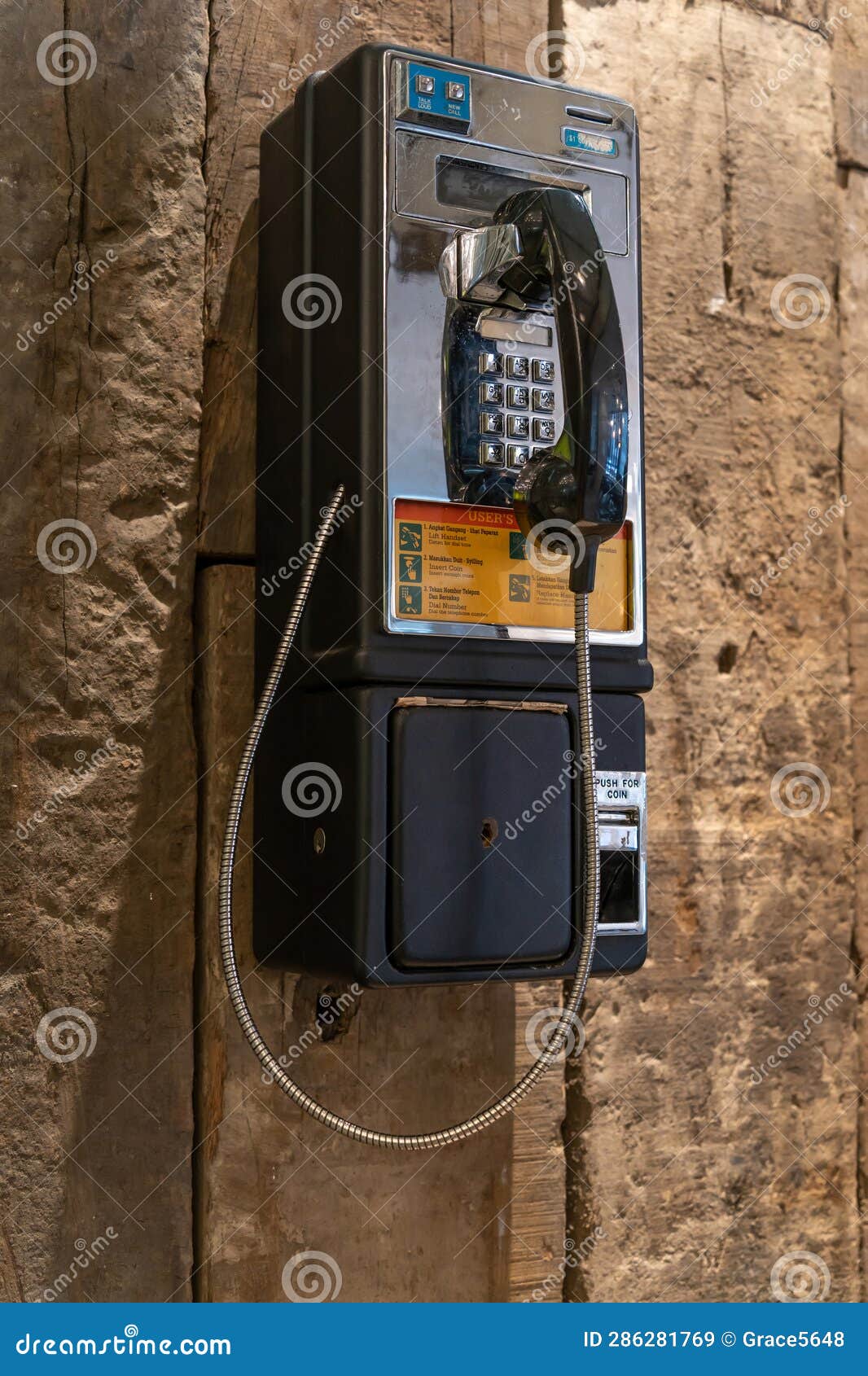 Close-up View of a Payphone on the Wooden Wall Stock Image - Image of ...