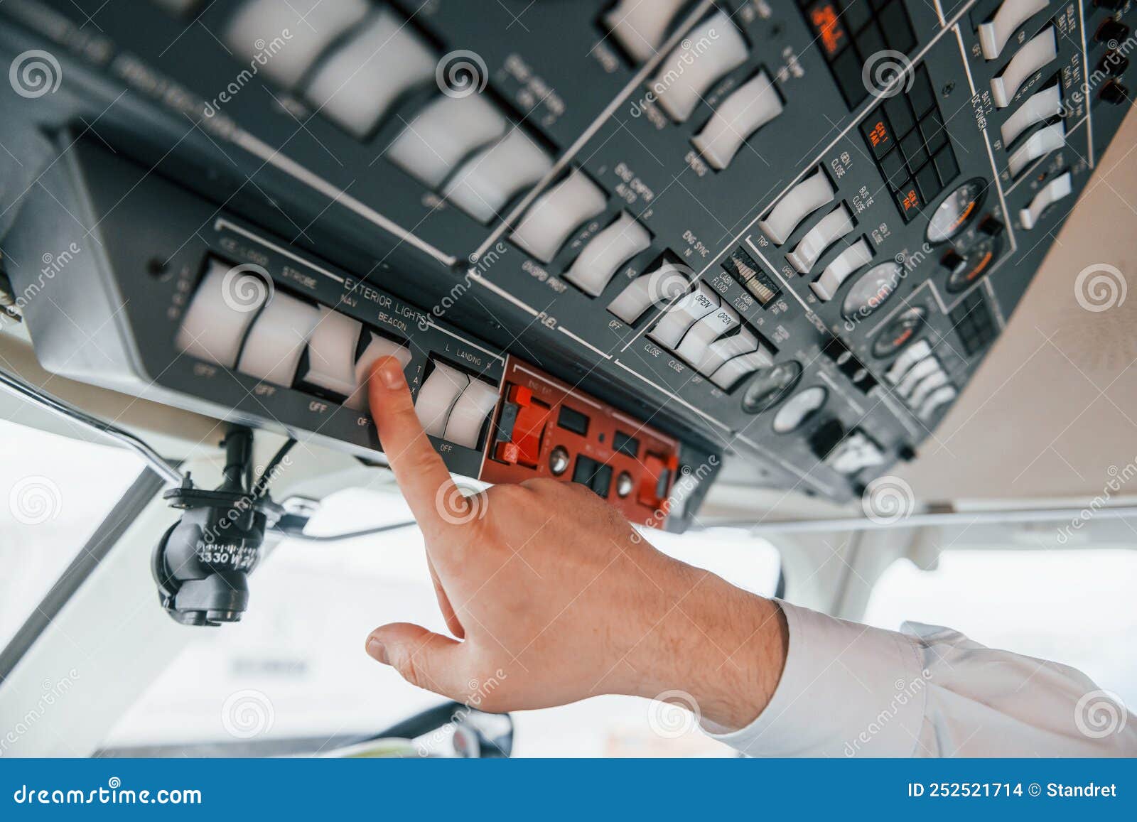 Close Up View. Pilot on the Work in the Passenger Airplane Stock Photo ...