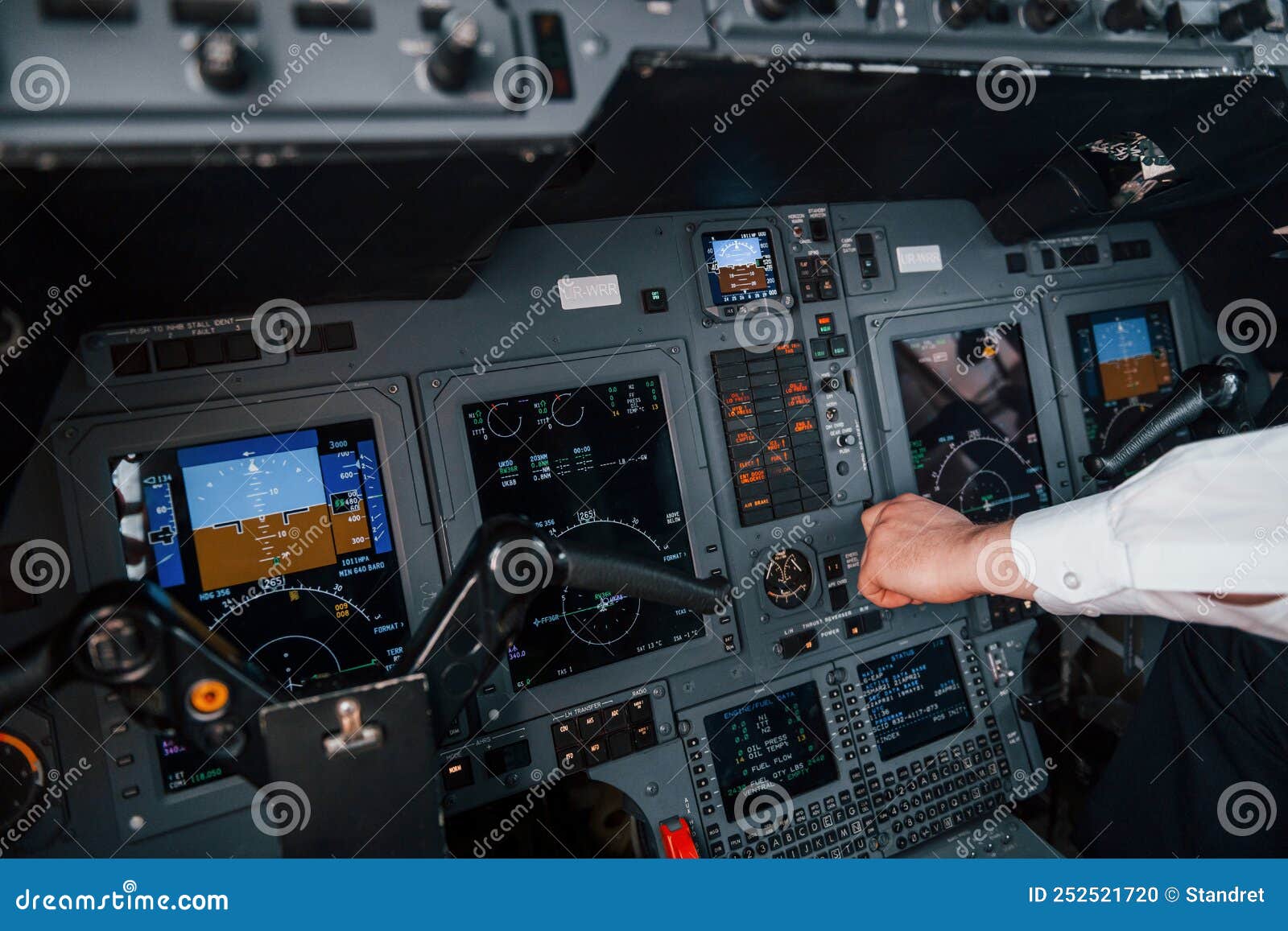 Close Up View. Pilot on the Work in the Passenger Airplane Stock Photo ...